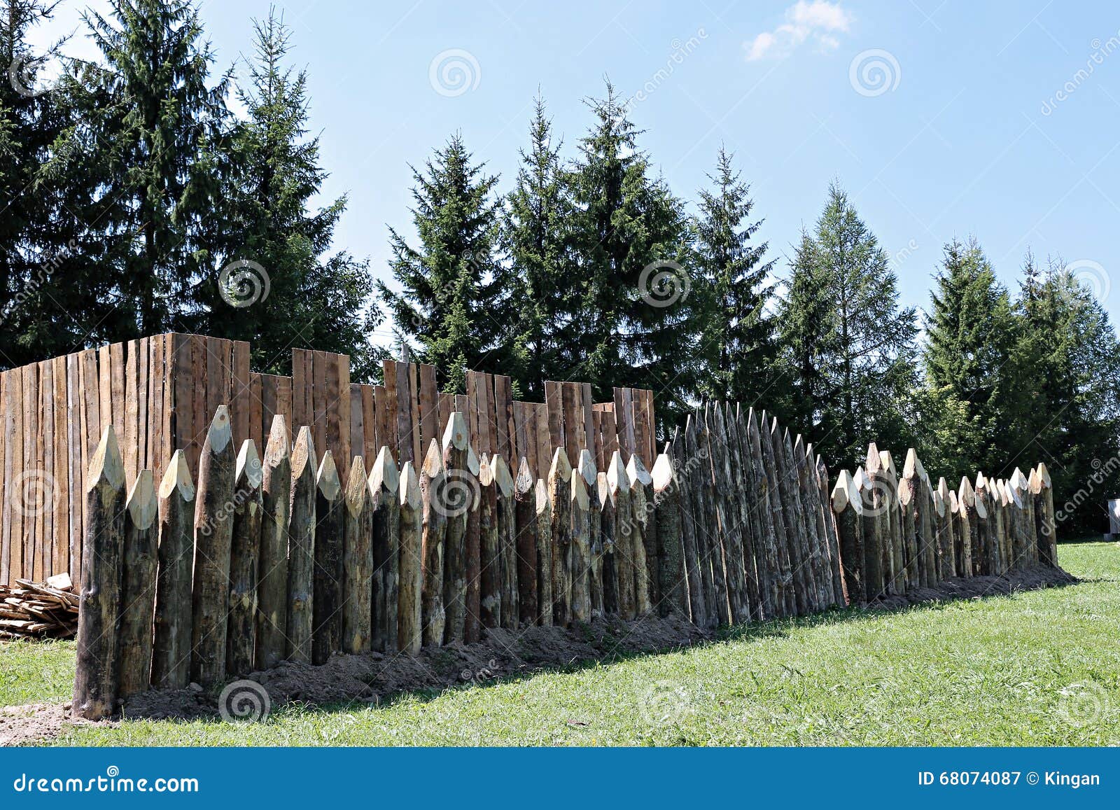 Fence Made of Sharpened Pointed Logs Stock Image - Image of impregnable ...