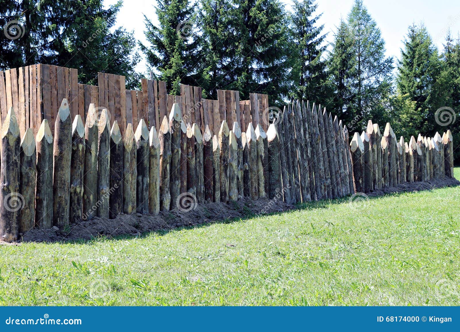 Fence Made of Sharpened Pointed Logs Stock Photo - Image of fort ...