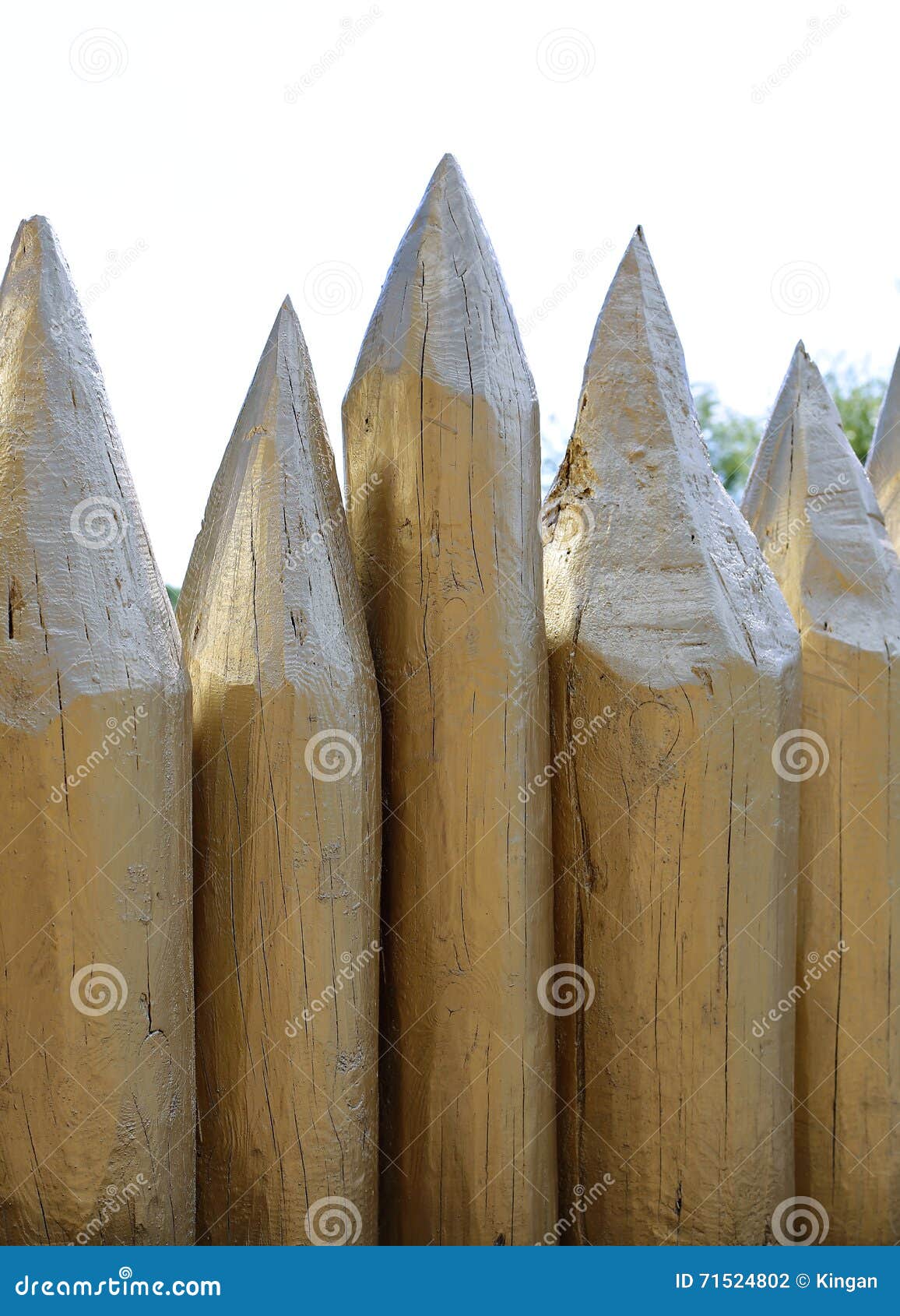 Fence Made of Sharpened Pointed Logs Stock Photo - Image of trunks ...