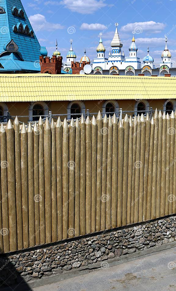 Fence Made of Sharpened Pointed Logs Stock Photo - Image of hedge ...
