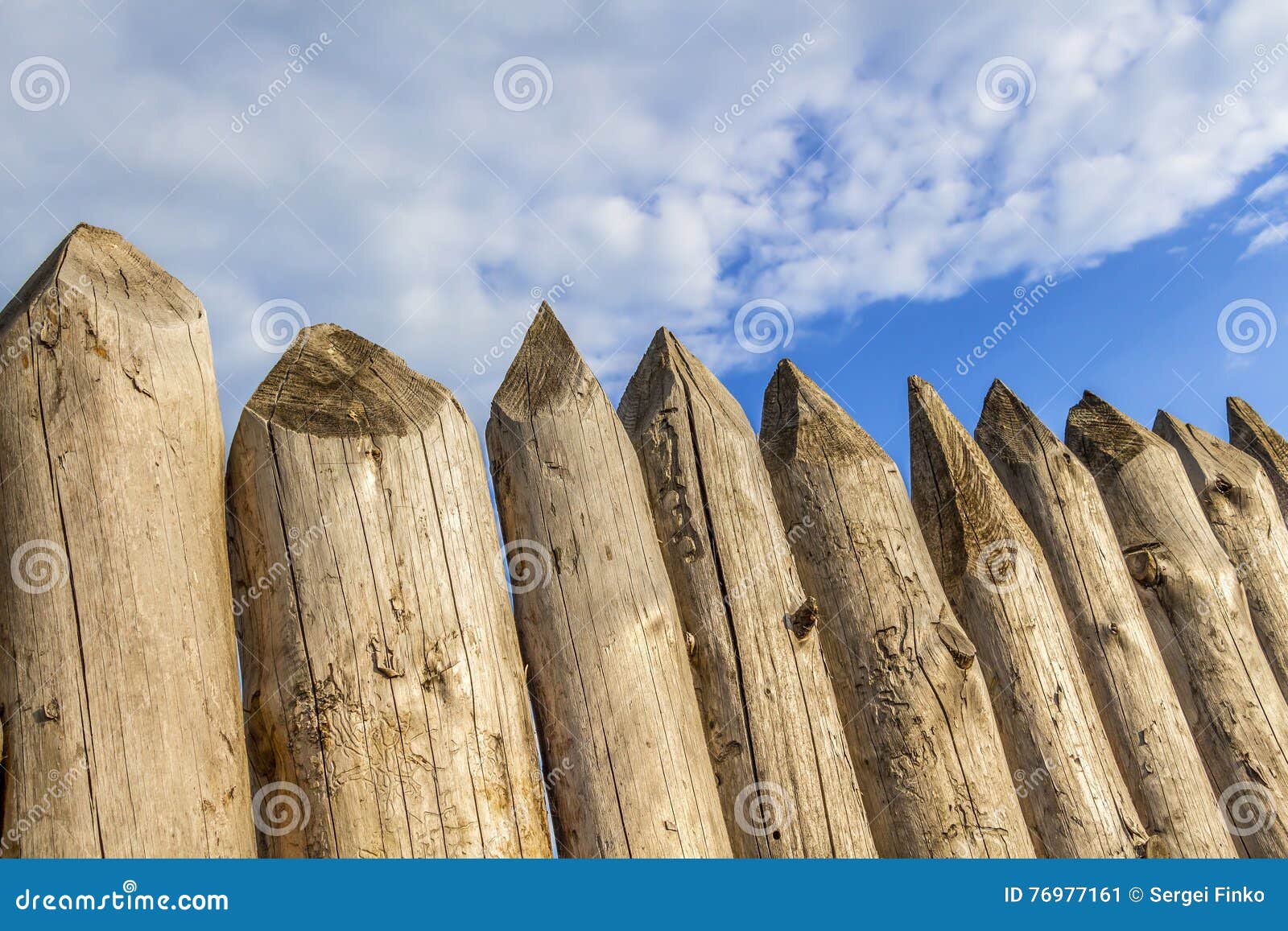 A fence made of stakes stock image. Image of obstacle - 76977161