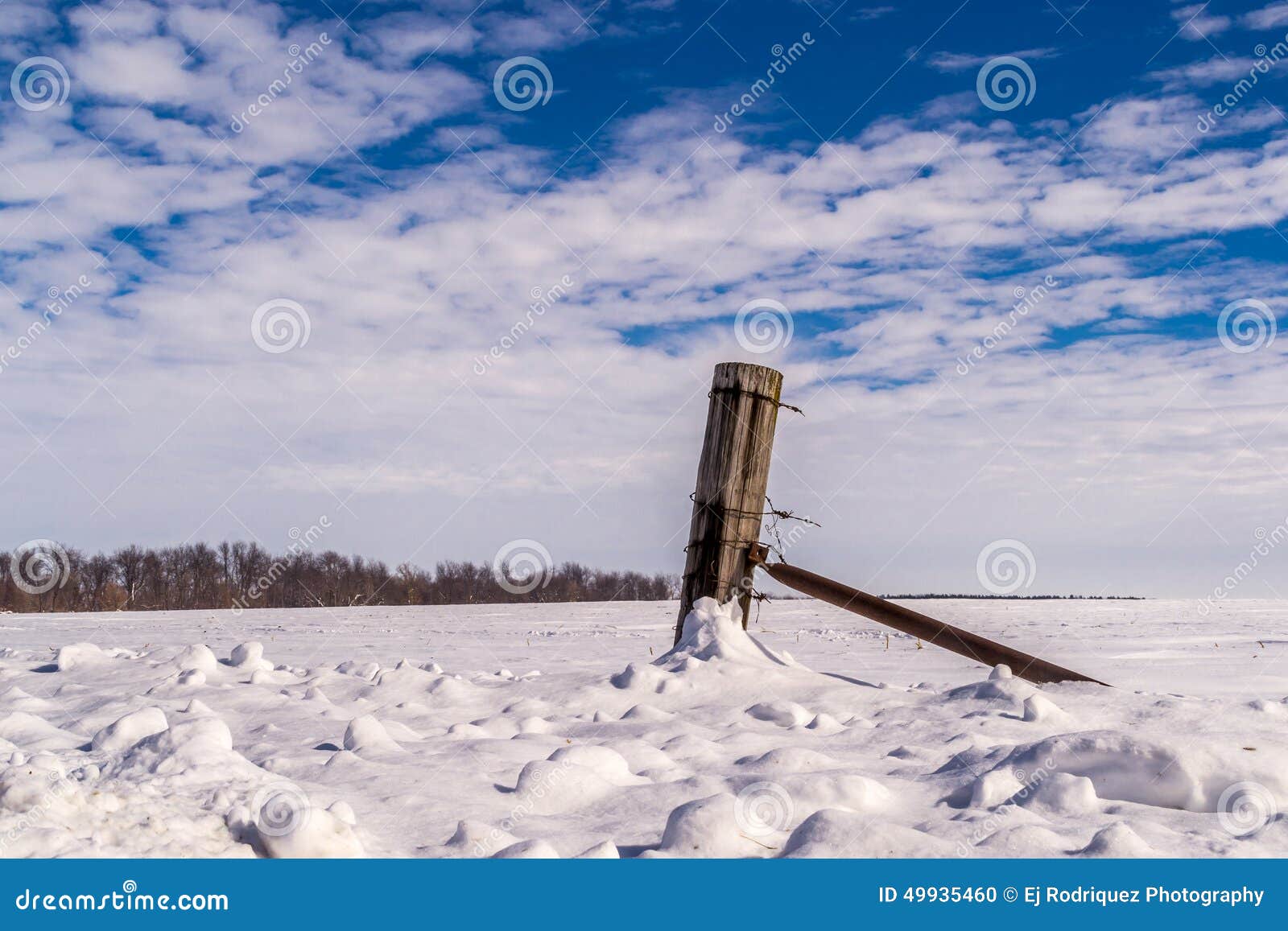 Fence Post in the snow. stock photo. Image of america - 49935460
