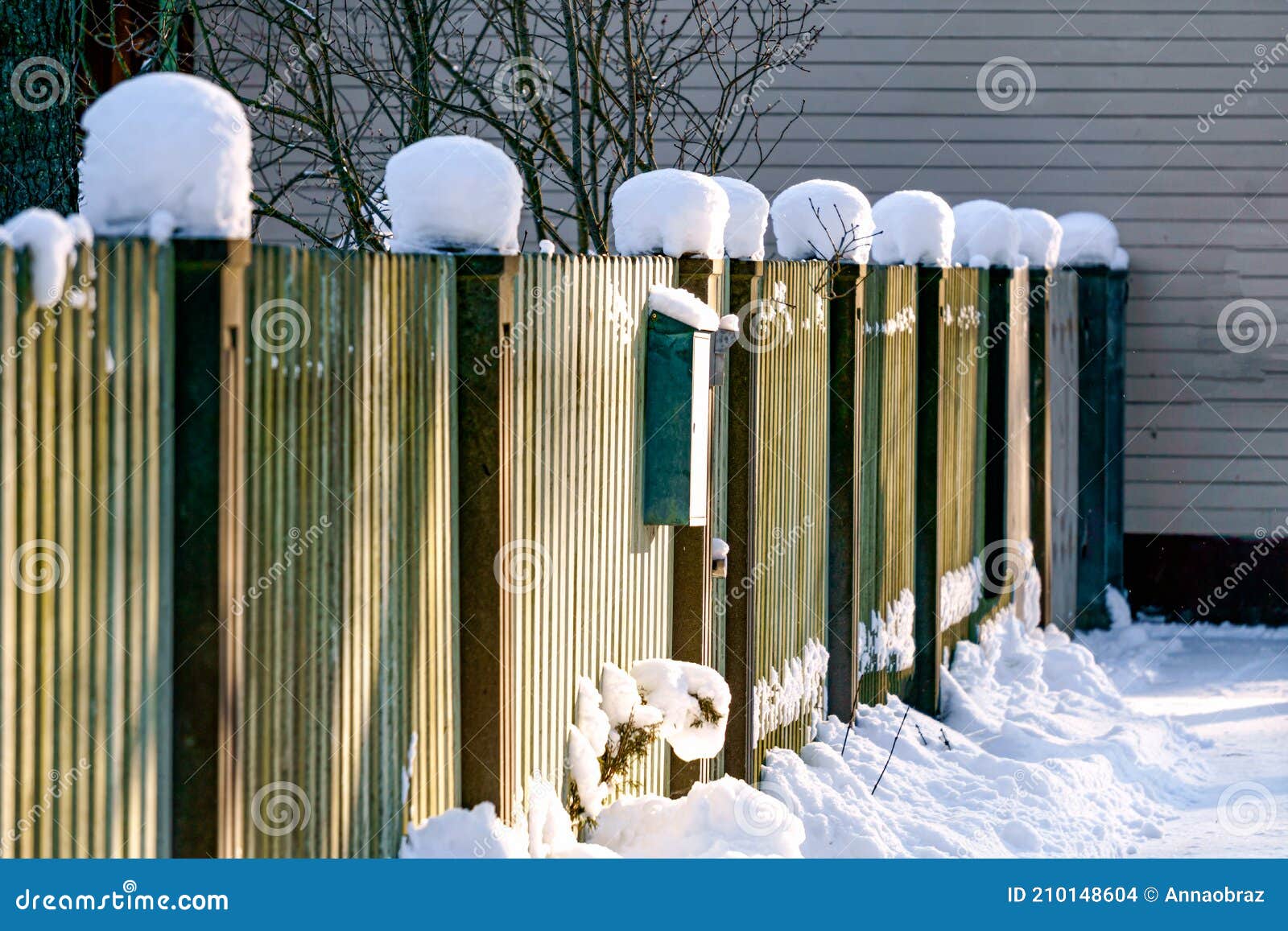 The Fence Posts are Covered with White Snow Stock Photo - Image of ...
