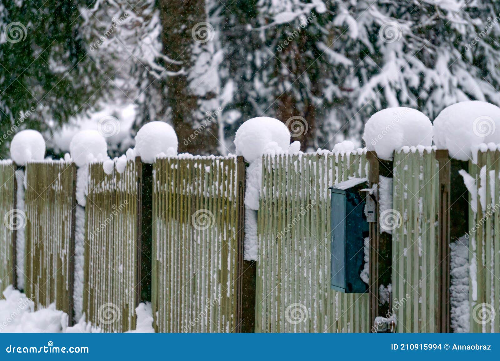 The Fence Posts are Covered with White Snow Stock Photo - Image of ...