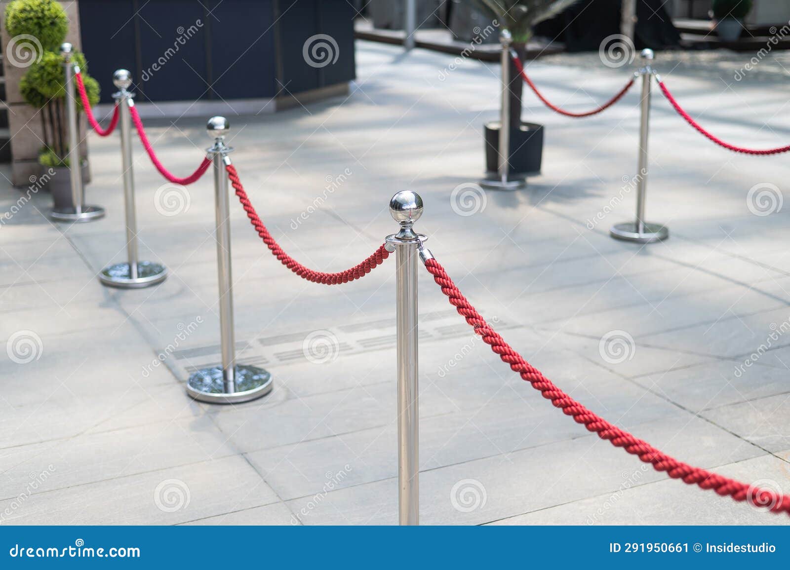 Fence posts with red rope. stock image. Image of festival - 291950661