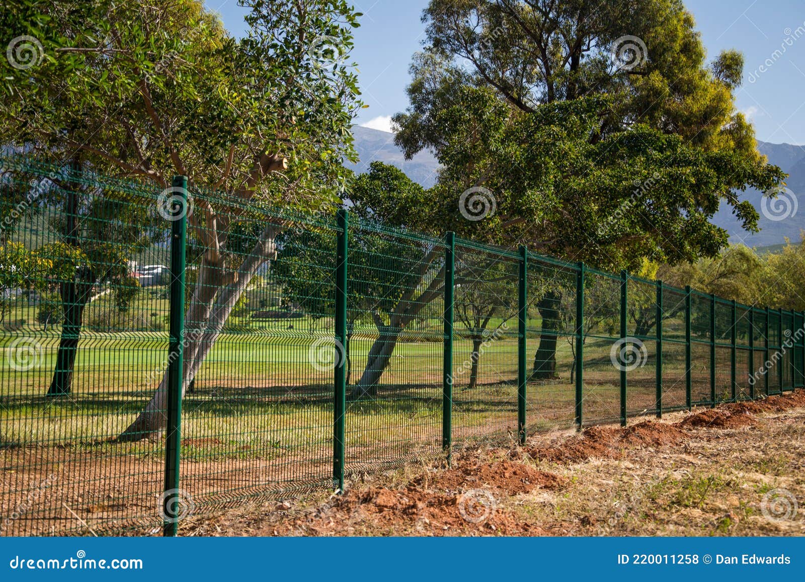 Fence Protoecting a Golf Course Stock Photo - Image of activities ...