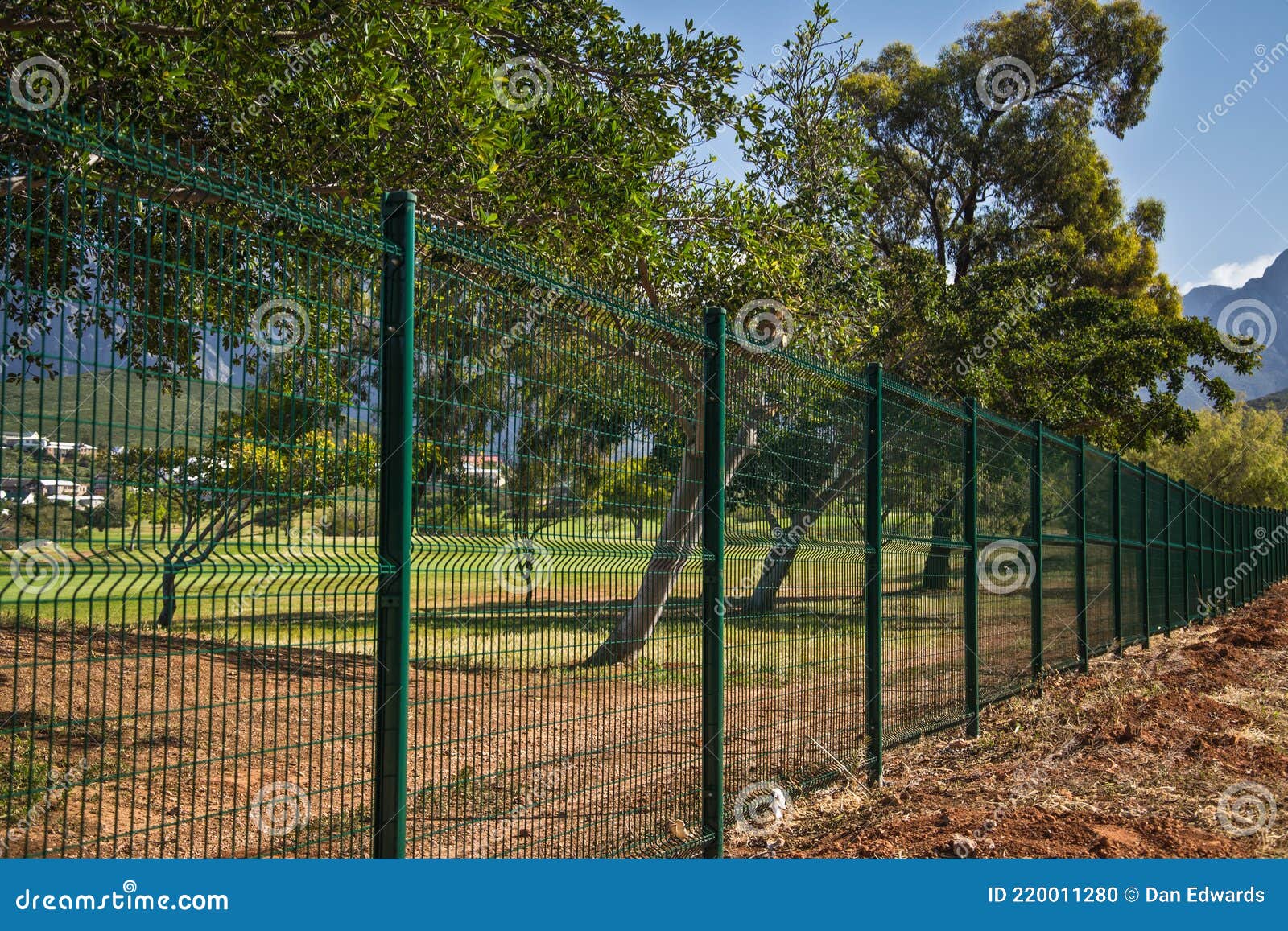 Fence Protoecting a Golf Course Stock Photo - Image of play, recreation ...