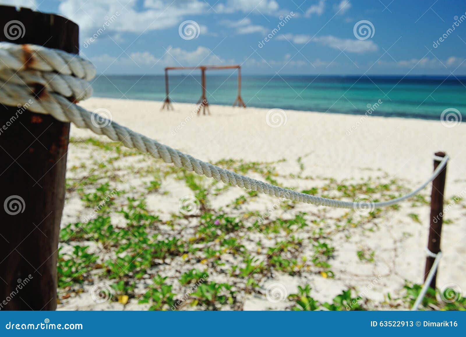 Fence from rope on beach stock image. Image of vacation - 63522913