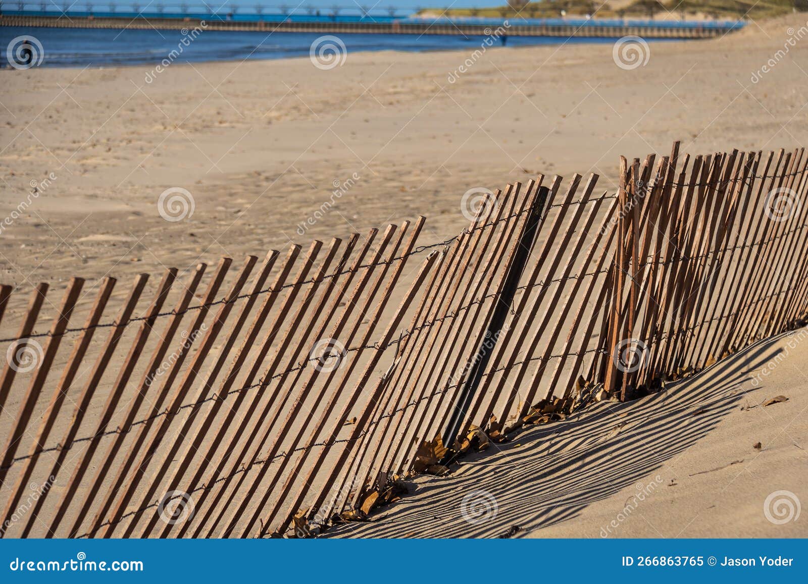 A Fence in a Sand Dune with Many Diagonal Lines Stock Image - Image of ...