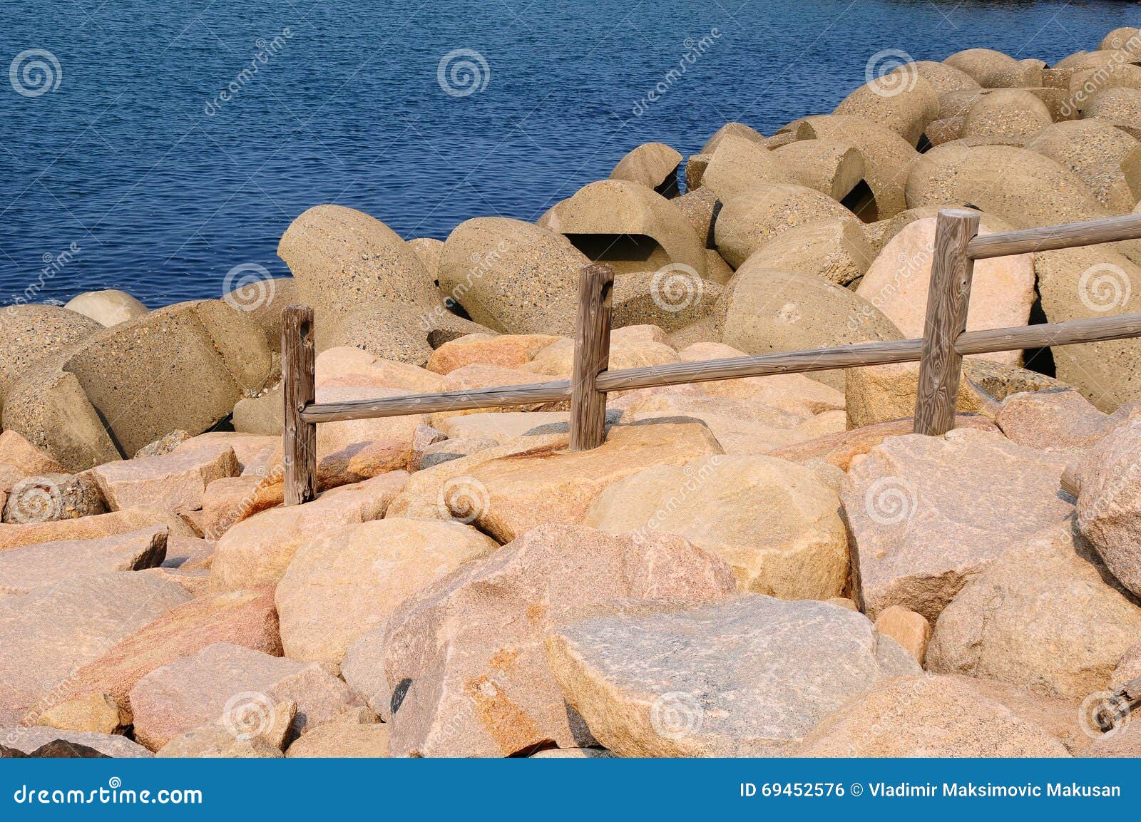 Fence on the Sea coast stock photo. Image of fence, rocks - 69452576