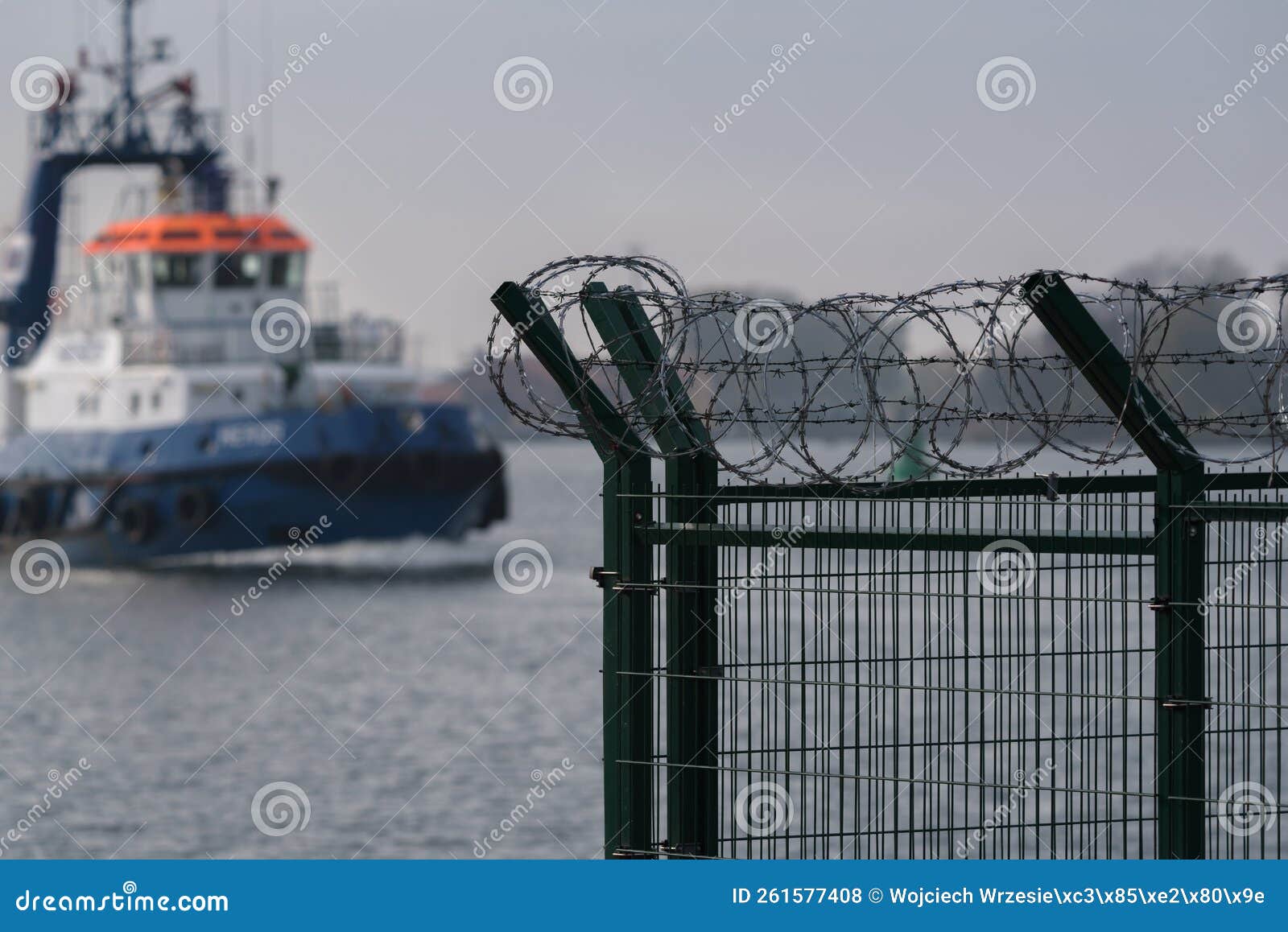 FENCE in SEA PORT stock photo. Image of area, danger - 261577408