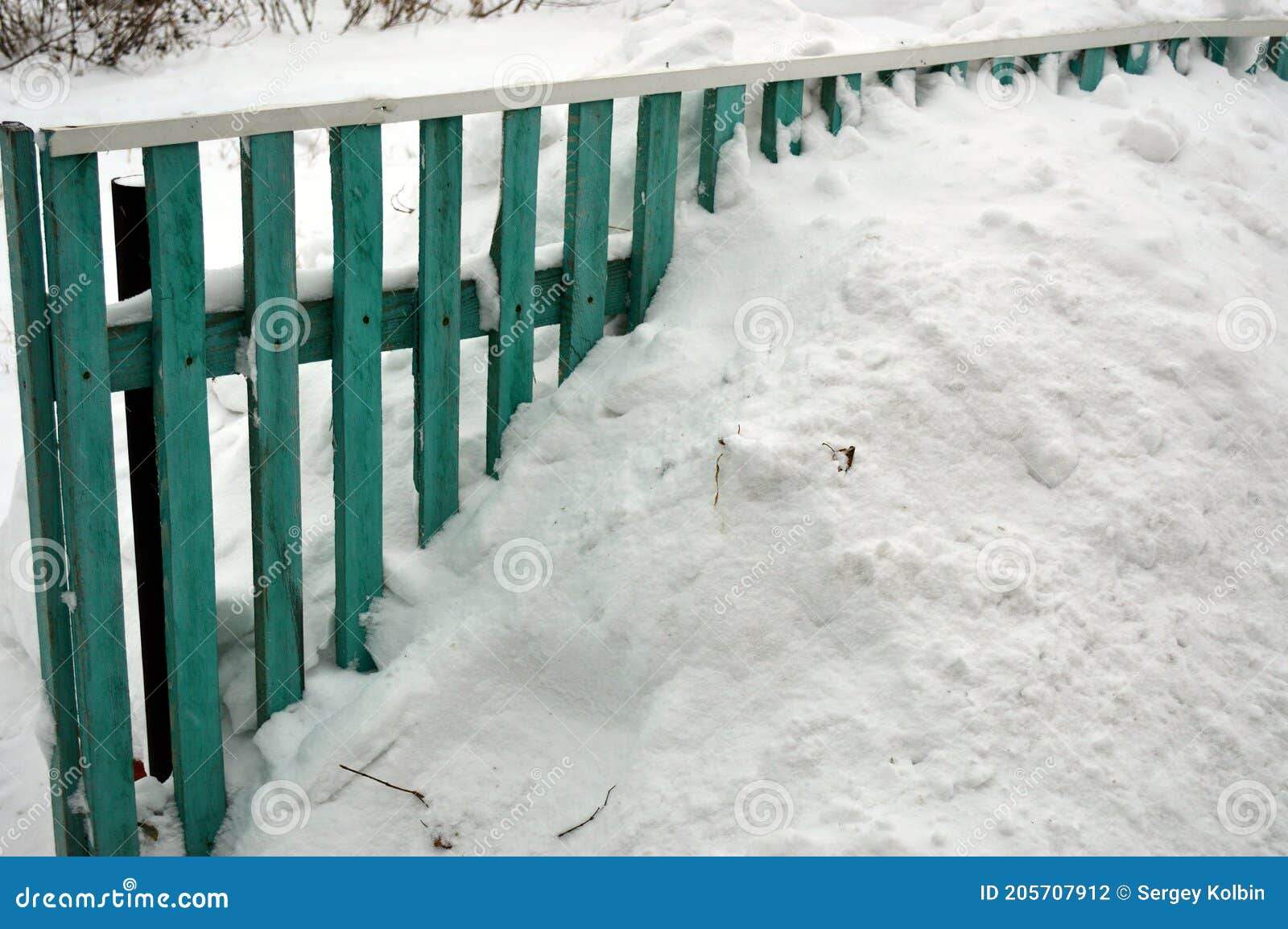Fence in the snow stock photo. Image of blizzard, janitor - 205707912