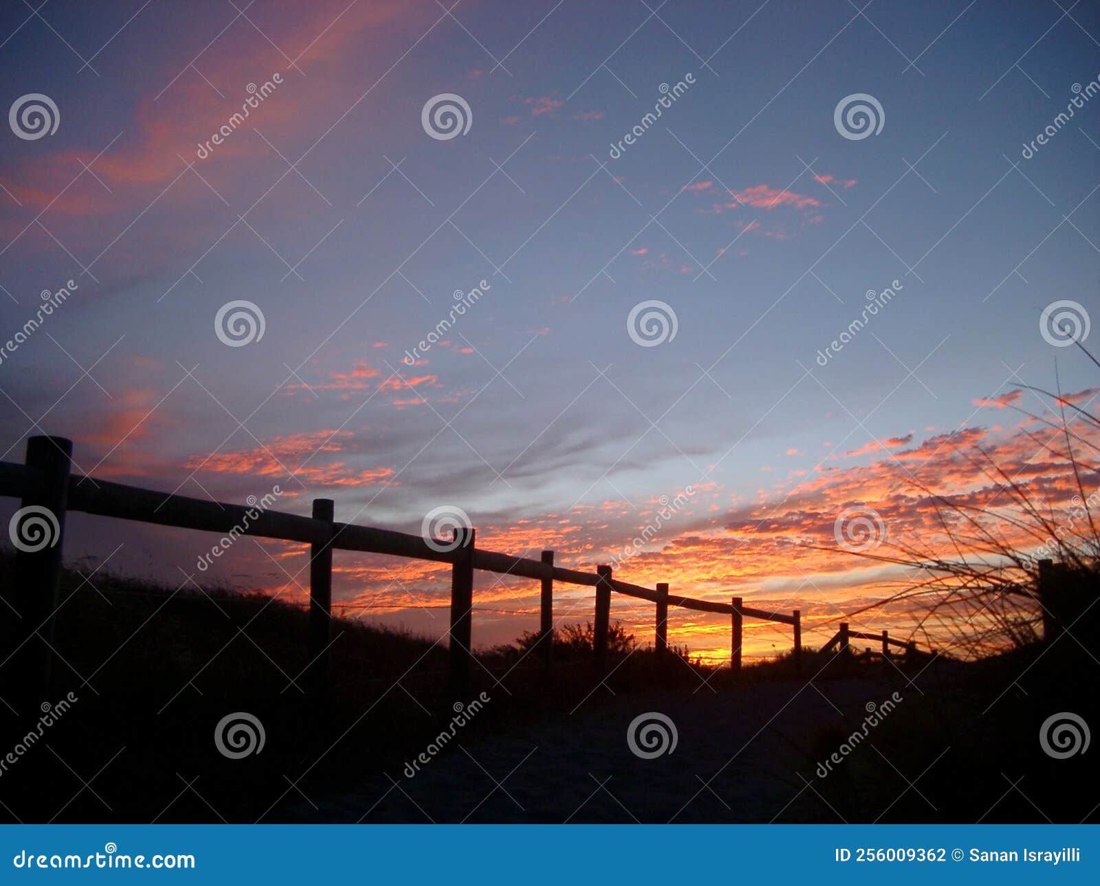 Fence sunset stock photo. Image of silhouette, pretty - 256009362