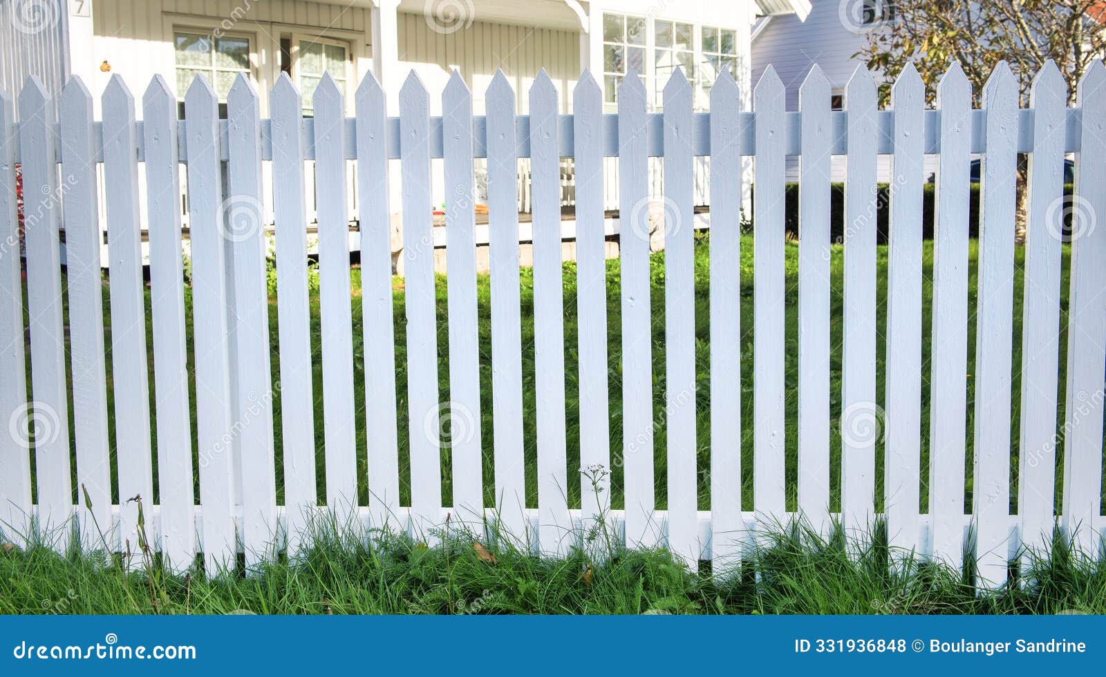 Fence of a White Wooden Garden in Front of Windows on White Facade ...