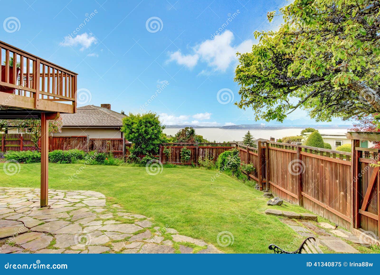 Fenced Backyard with Water View Stock Image - Image of exterior, design ...
