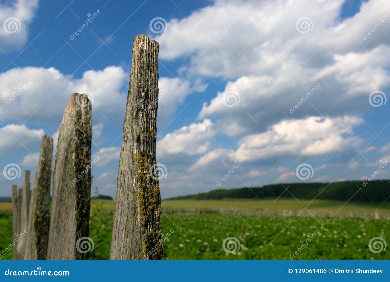 Fenced Field Against during the Sunset. Stock Photo - Image of cloud ...