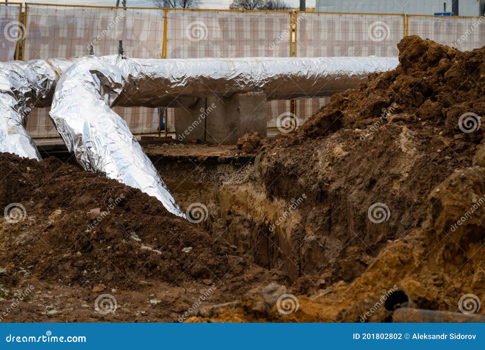 Trench and Pipes of the Heating System in Shiny Thermal Insulation ...