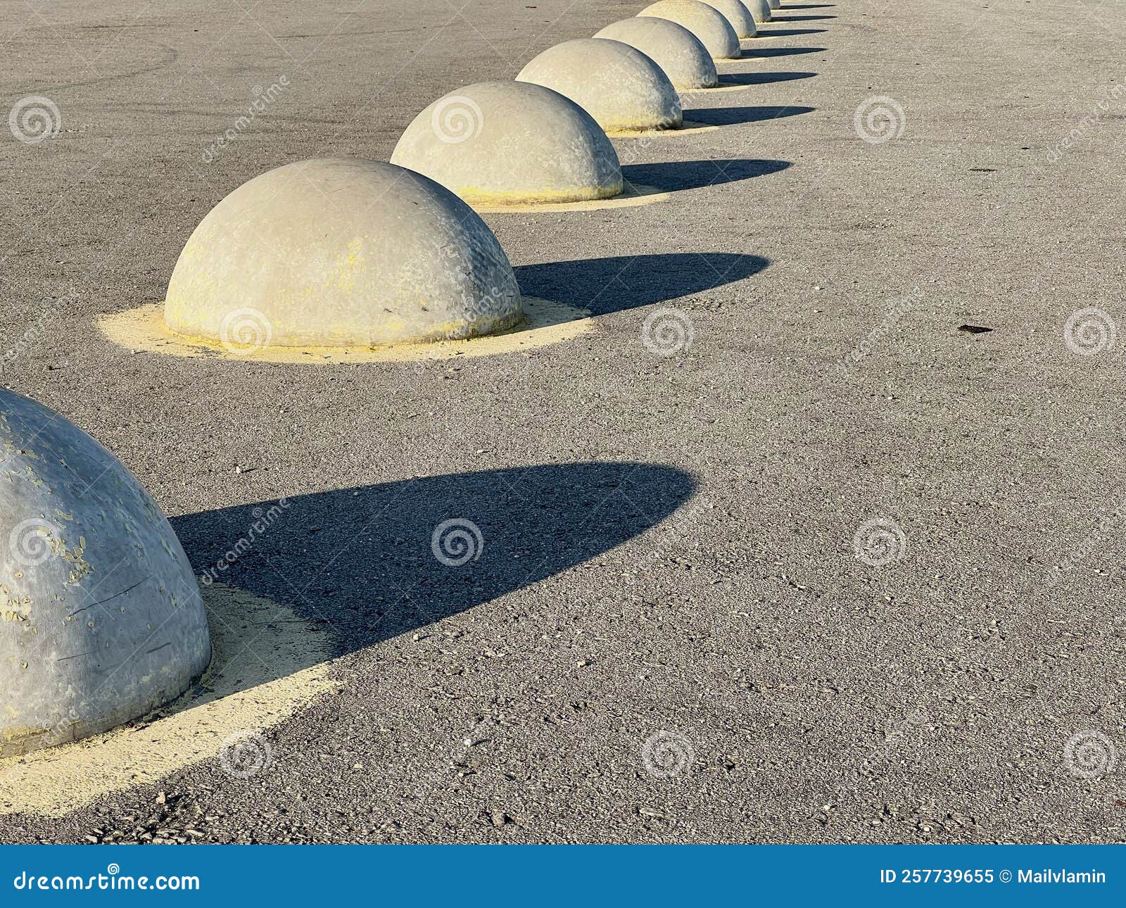 Fencing On The Asphalt Road In The Form Of Large Hemispheres Stock ...