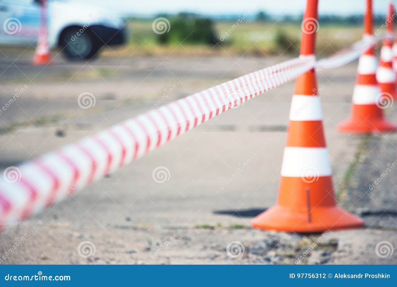 Fencing tape and road cone stock photo. Image of hazard - 97756312