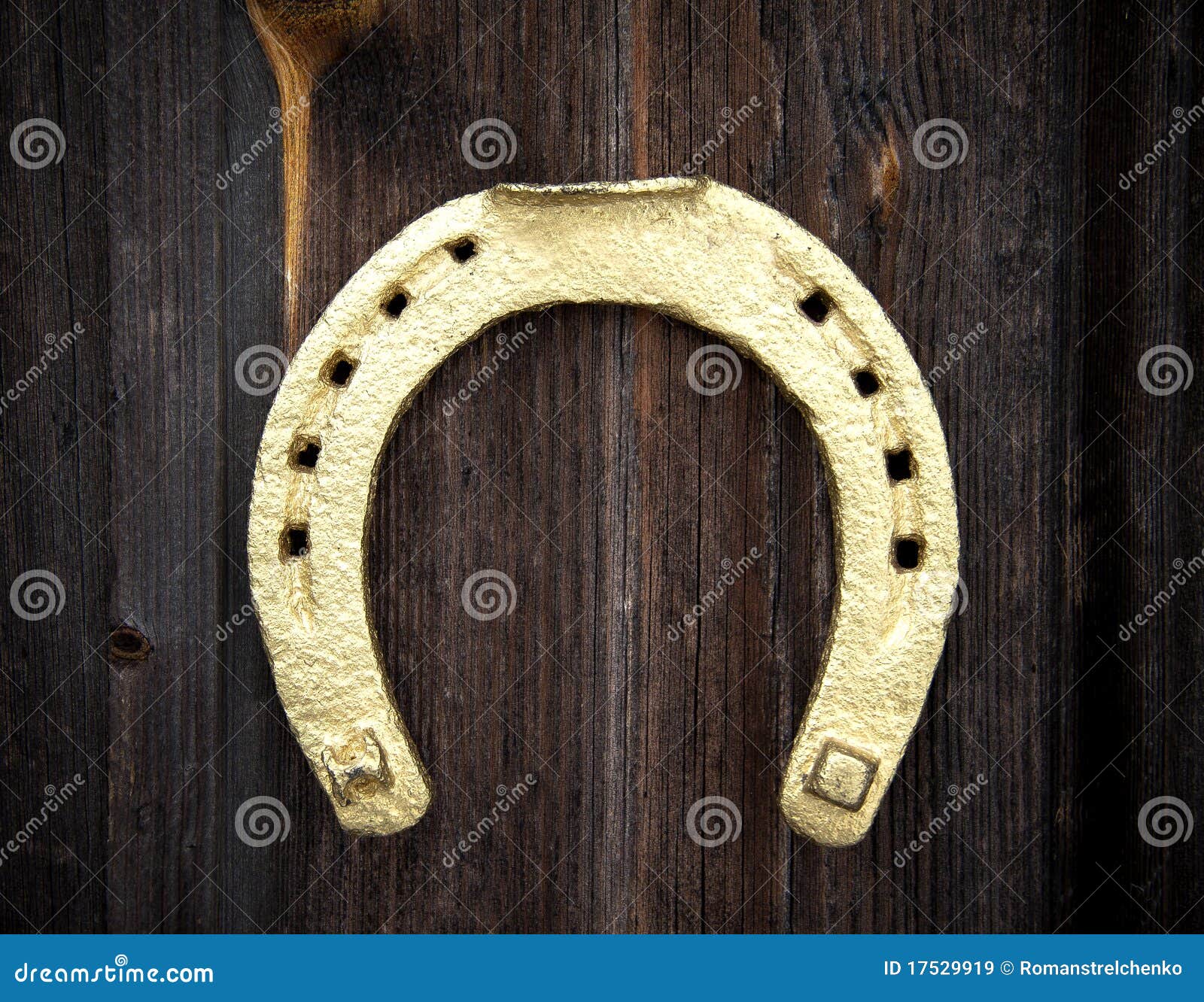 Fer à cheval d'or image stock. Image du fond, d0, bois - 17529919