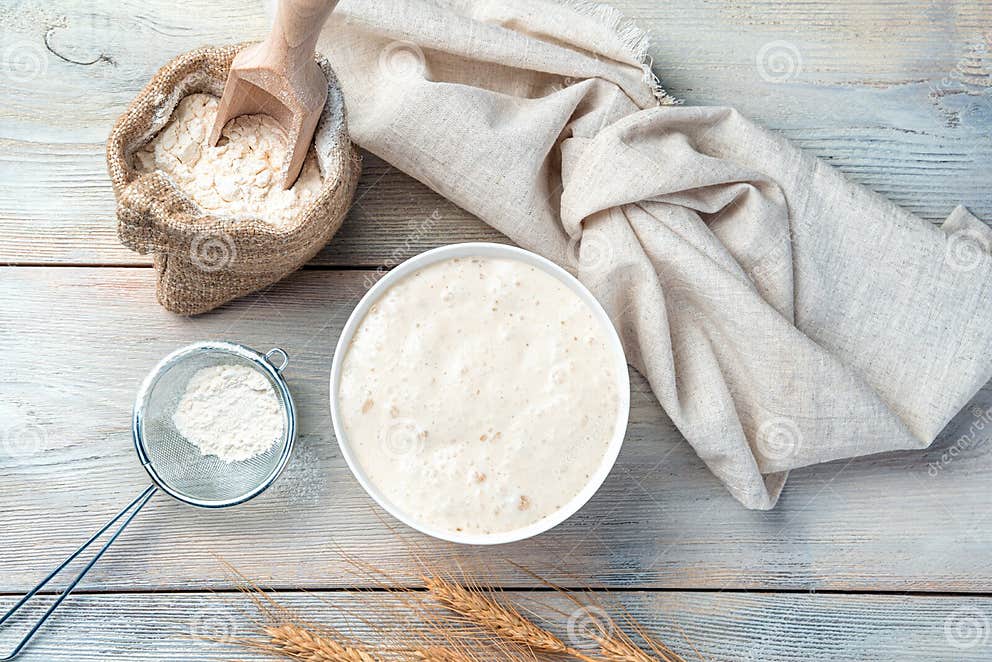 Fermentation of Bread. Wheat Sourdough and Flour on a Light Background ...