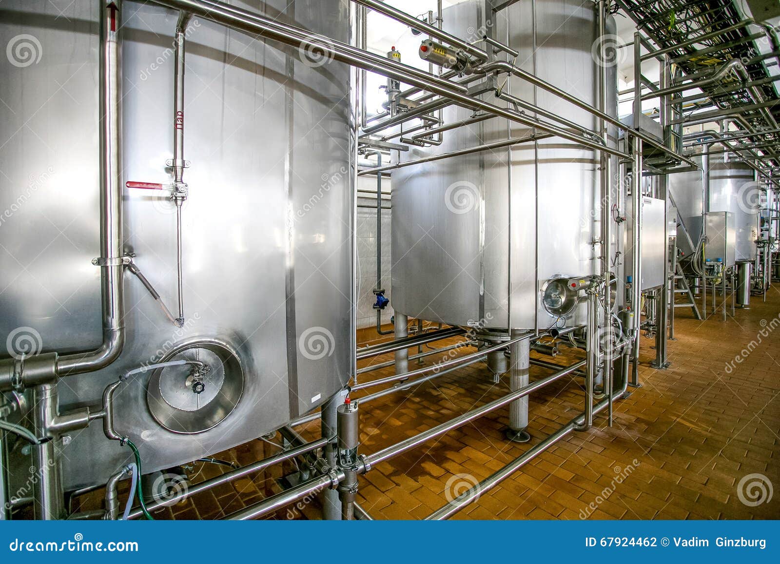 Fermentation in huge vats stock photo. Image of tank - 67924462