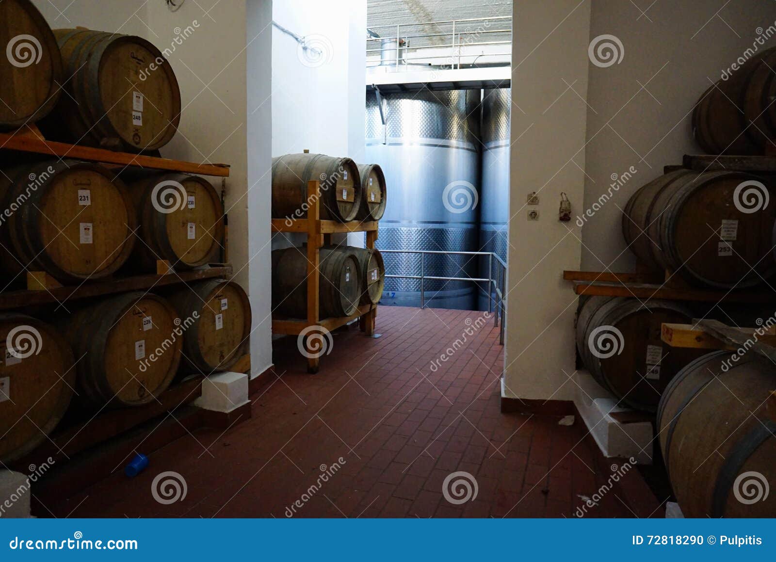 Fermentation Tanks and Barrels of Wine in Cellar in Santorini. Stock ...