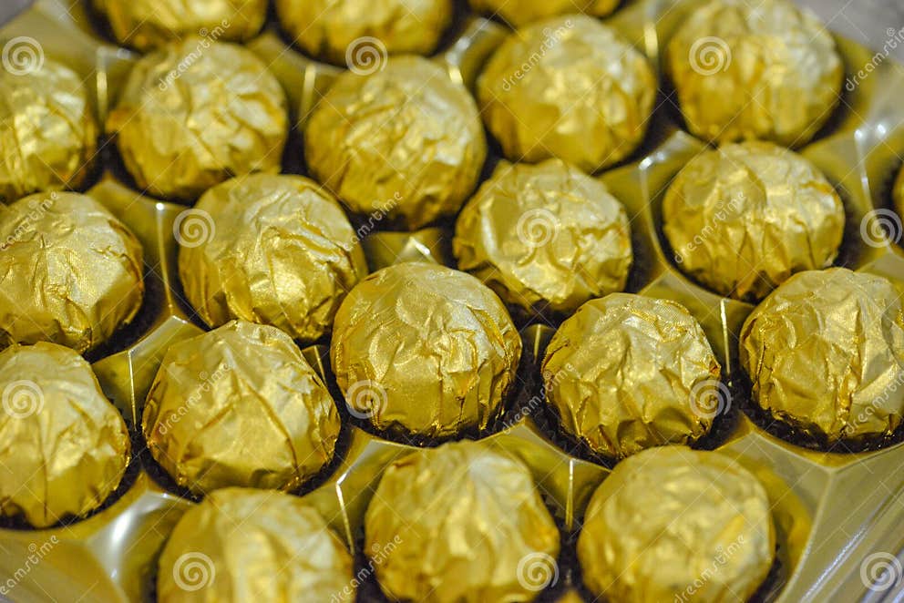Ferrero Rocher chocolate stock image. Image of font - 187978123