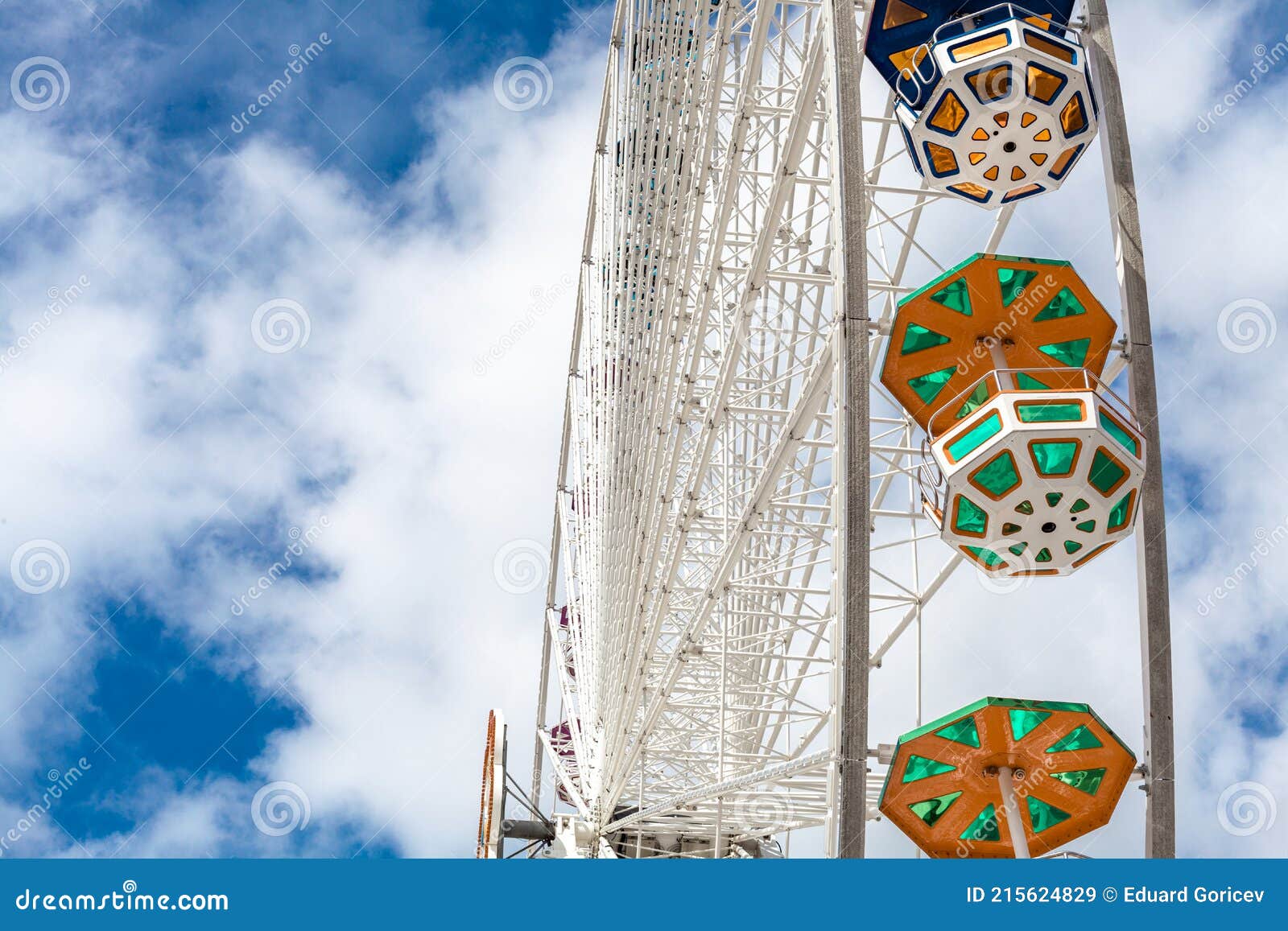Ferris Wheel in an Amusement Park.Blue Sky. Copy Space Stock Image ...