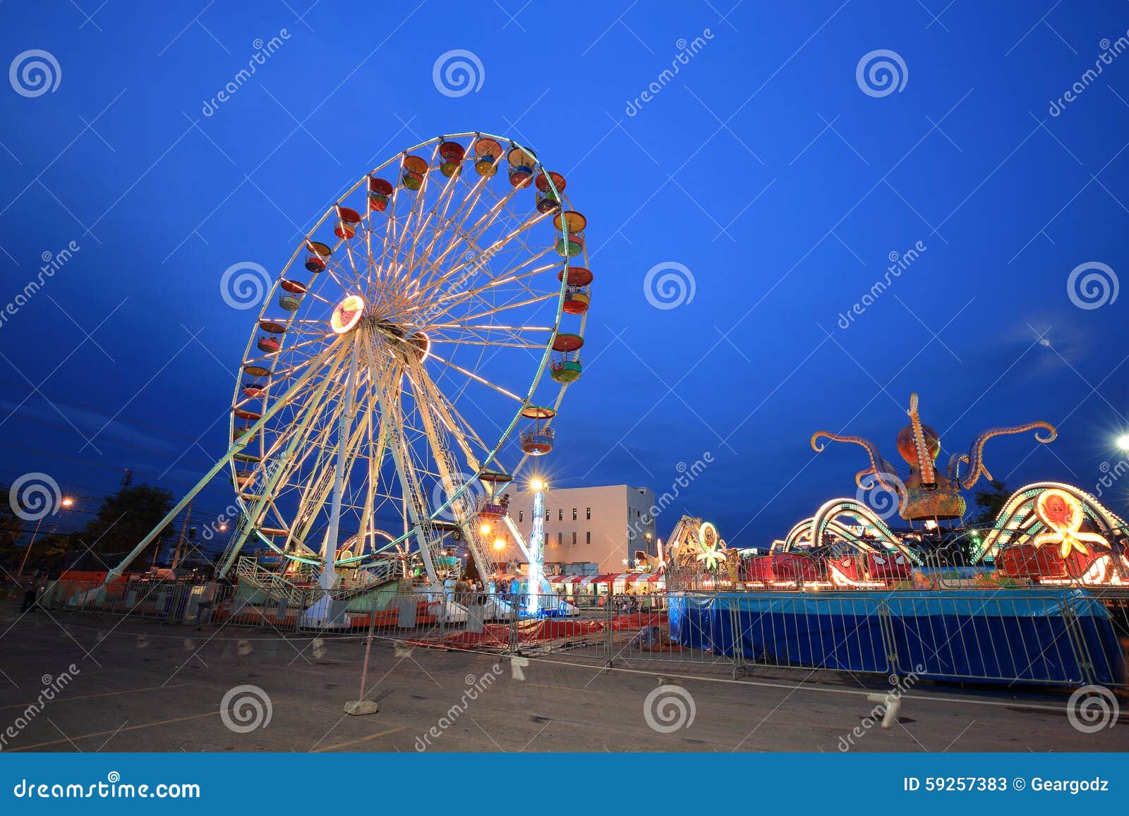 Ferris Wheel at Amusement Park Stock Image - Image of blue, high: 59257383