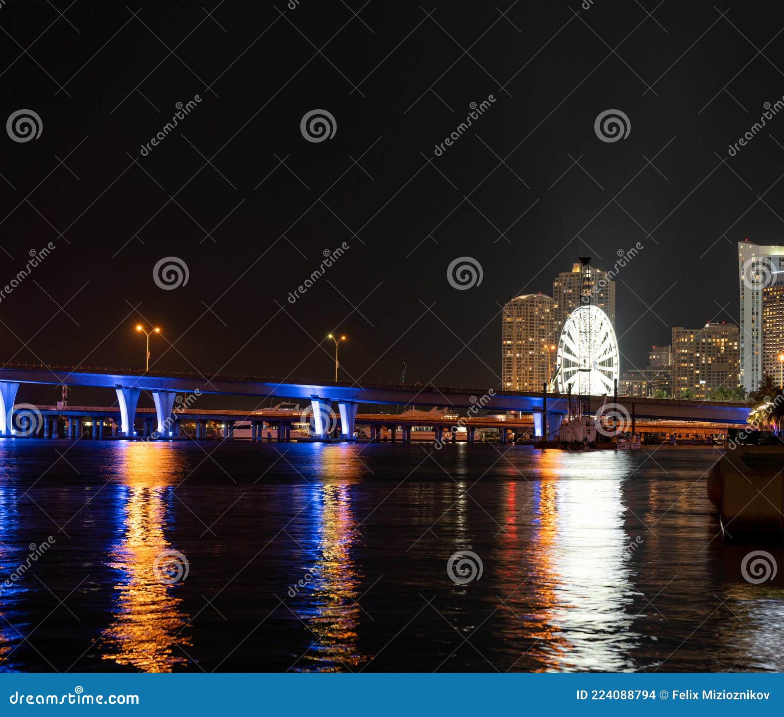 Ferris Wheel at Bayside Miami with Neon Bridge Stock Photo - Image of ...