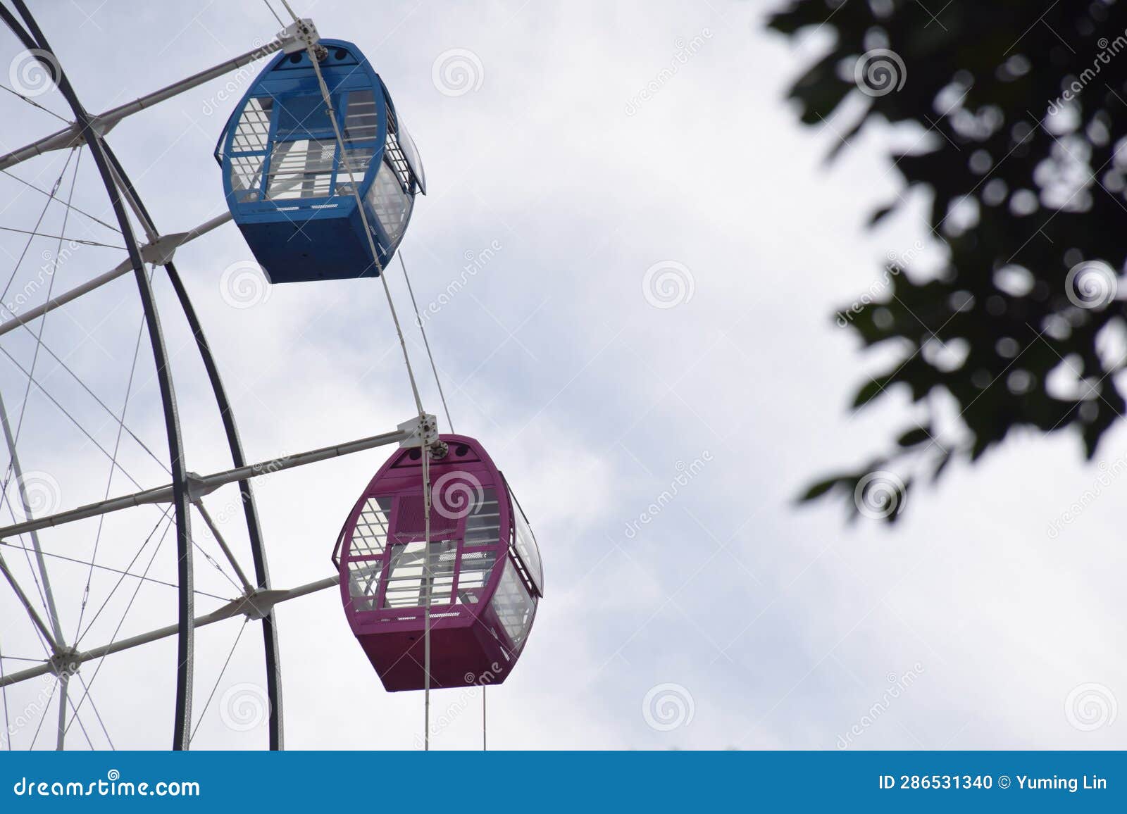 Ferris Wheel Blue and Pink House Stock Photo - Image of park, lighting ...
