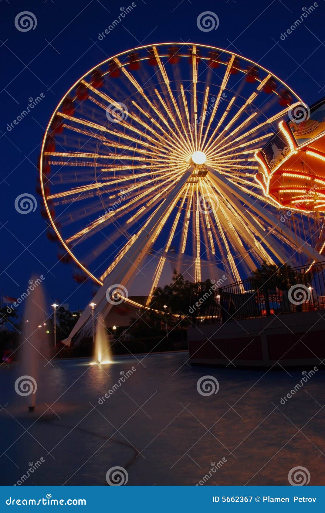 Ferris Wheel and Carousel editorial photography. Image of carousel ...