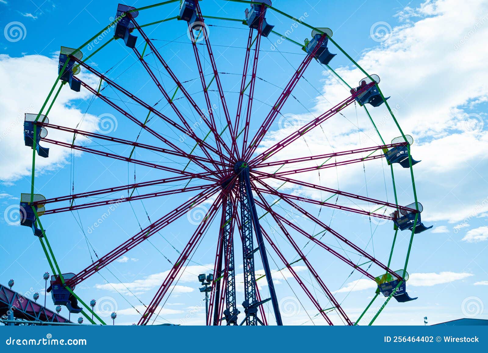 Ferris Wheel Carousel Against the Sunny Sky Stock Photo - Image of ...