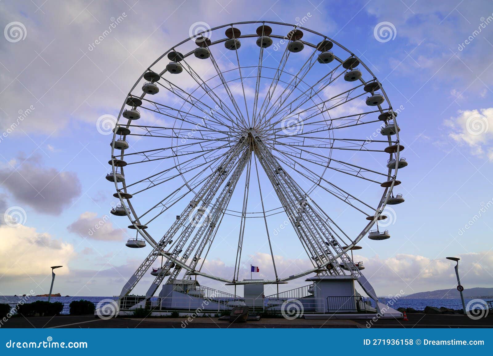 Ferris Wheel Circle Fun Fair on Blue Cloud Sky Background Stock Photo ...