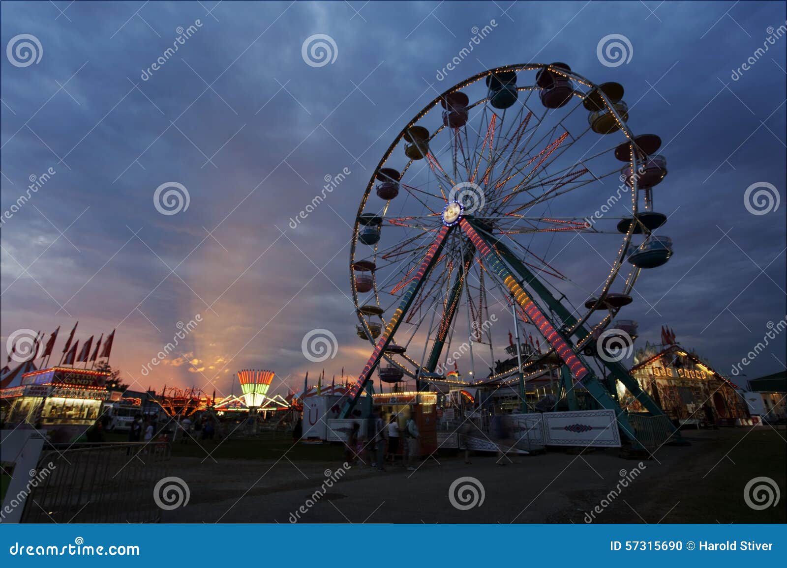Ferris Wheel at the Fair at Sunset Stock Photo - Image of child ...