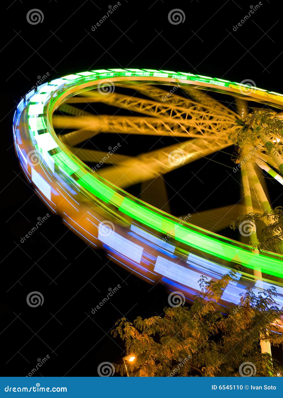 Ferris Wheel in motion stock photo. Image of exposure - 6545110