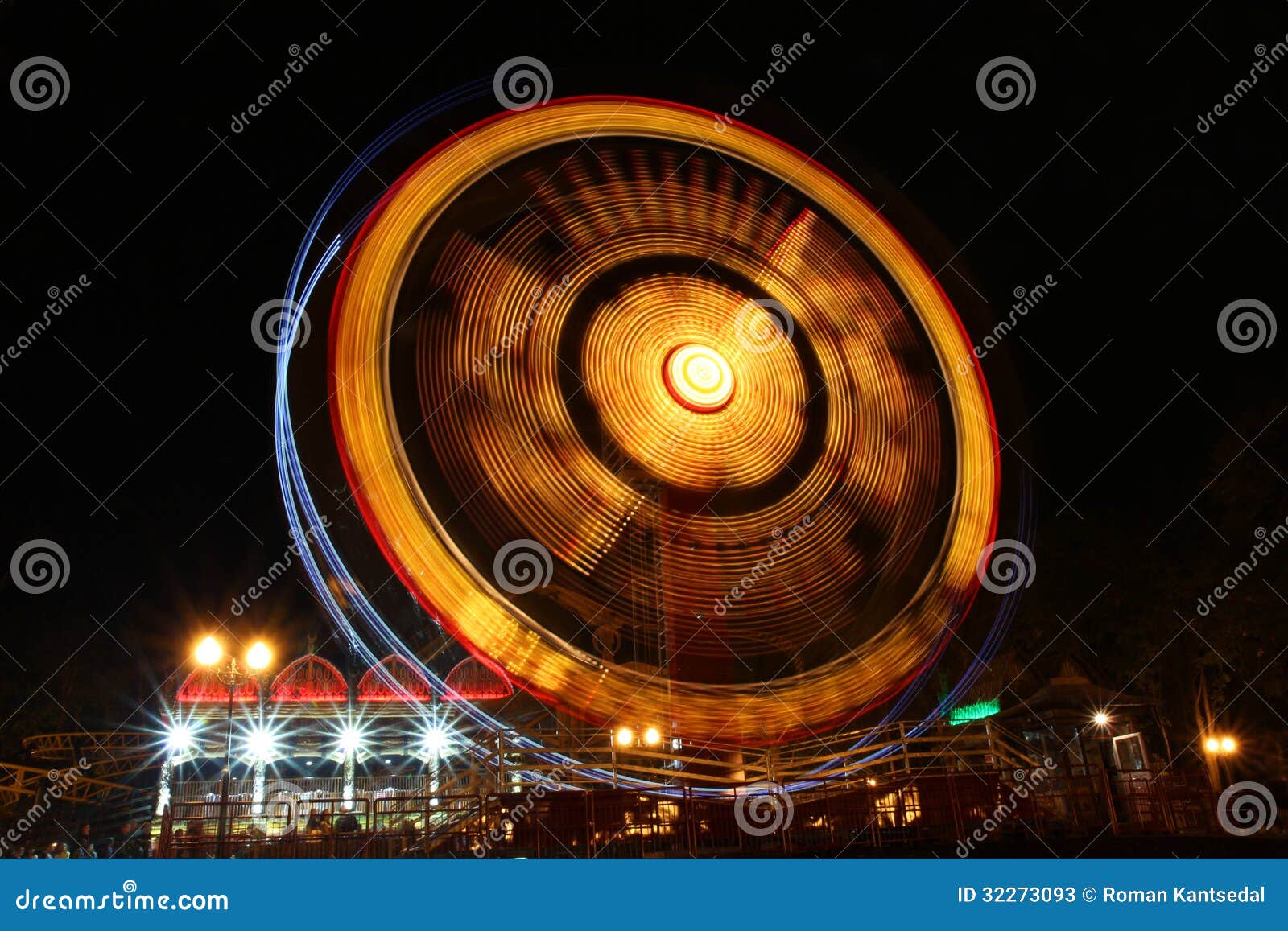 Ferris Wheel in Motion Illuminated at Night Stock Image - Image of ...