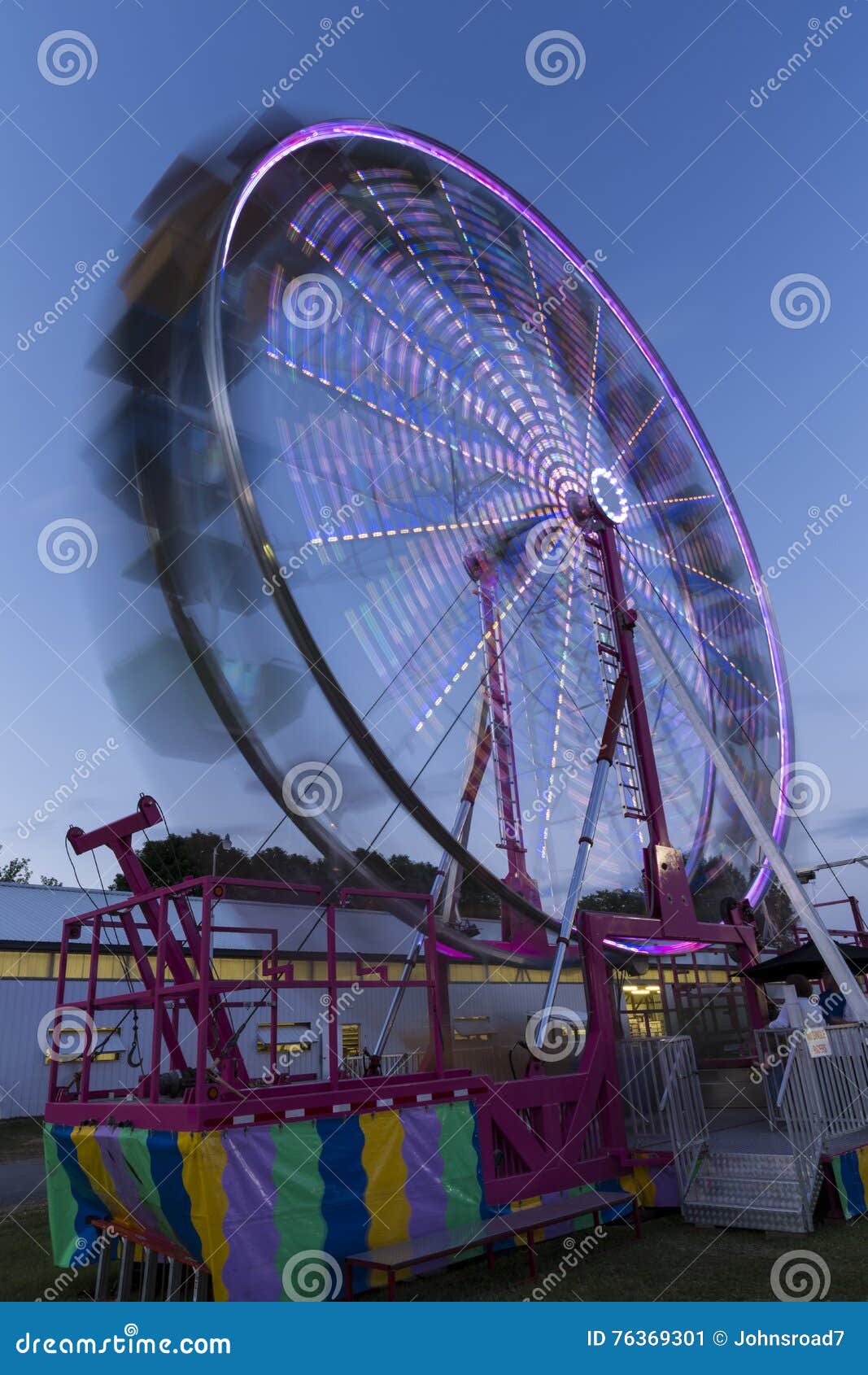 Ferris Wheel in Motion stock image. Image of colorful - 76369301