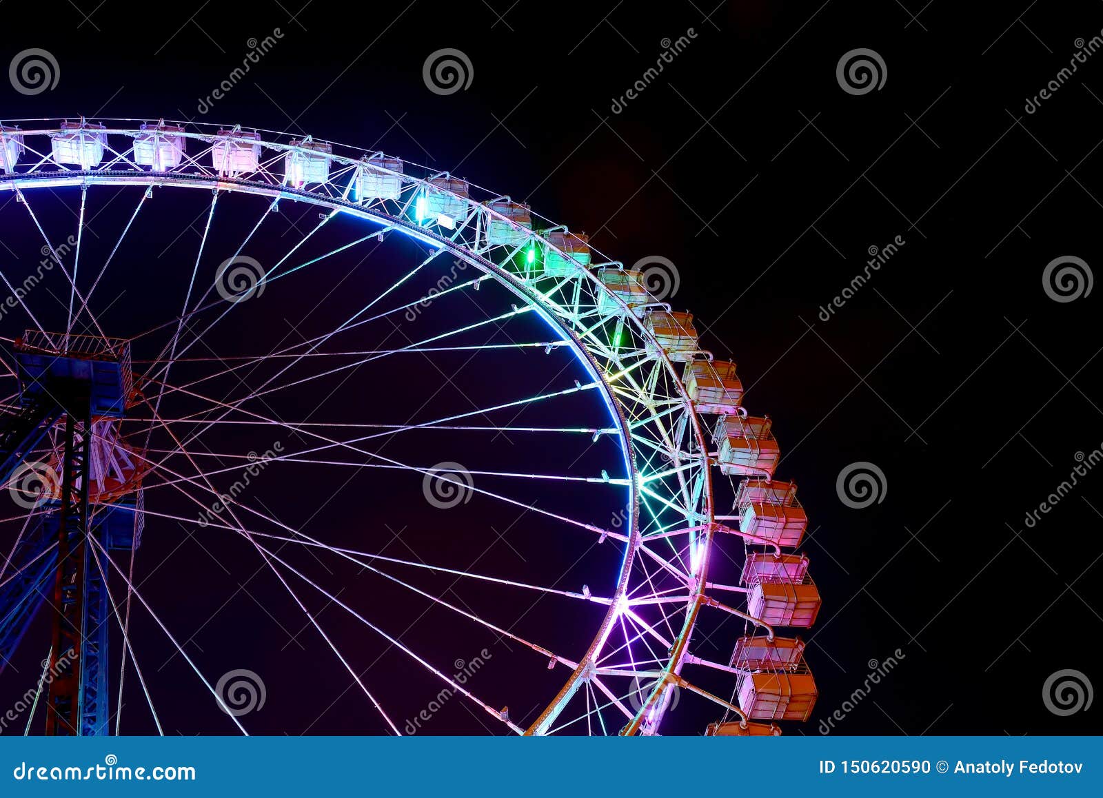Ferris Wheel with Multicolor Lighting Against a Night Sky Background ...