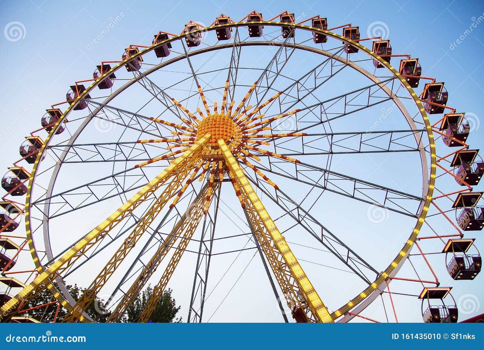 Ferris Wheel and Rollercoaster in Motion at Amusement Park Stock Photo ...