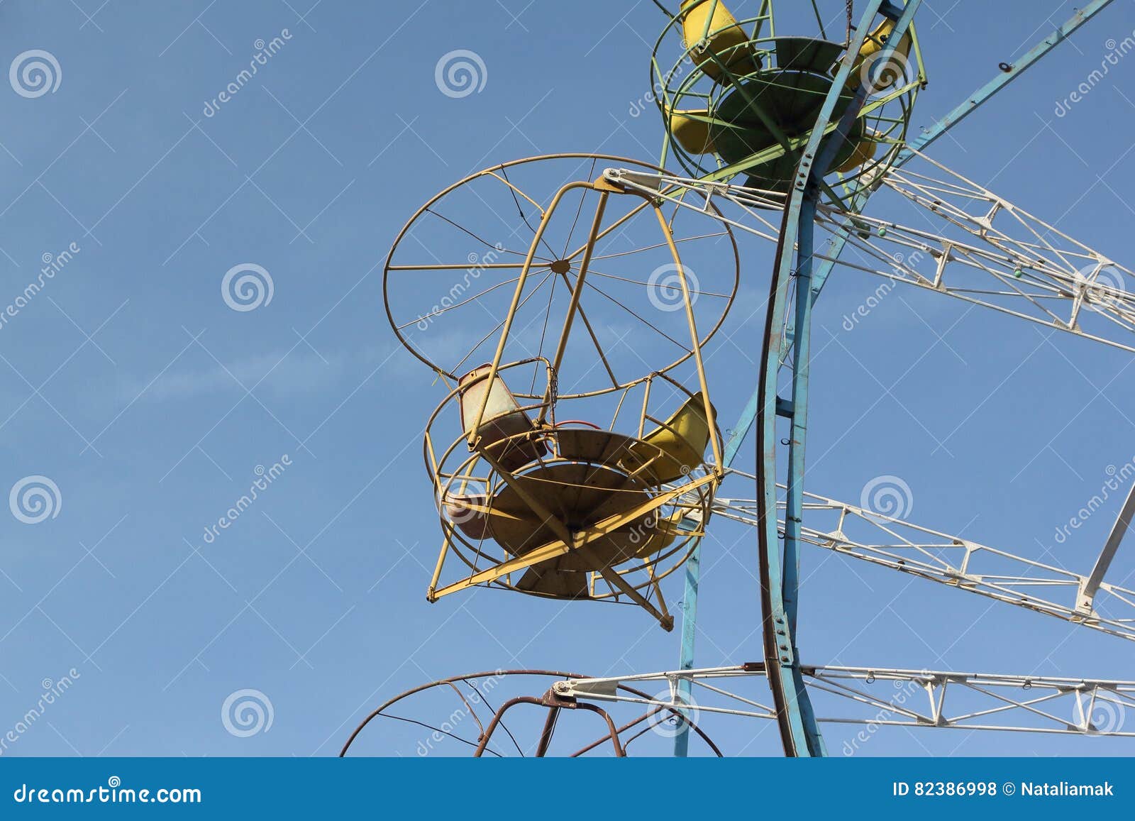 Ferris Wheel with Round Open Cabins Against of the Blue Sky Stock Photo ...