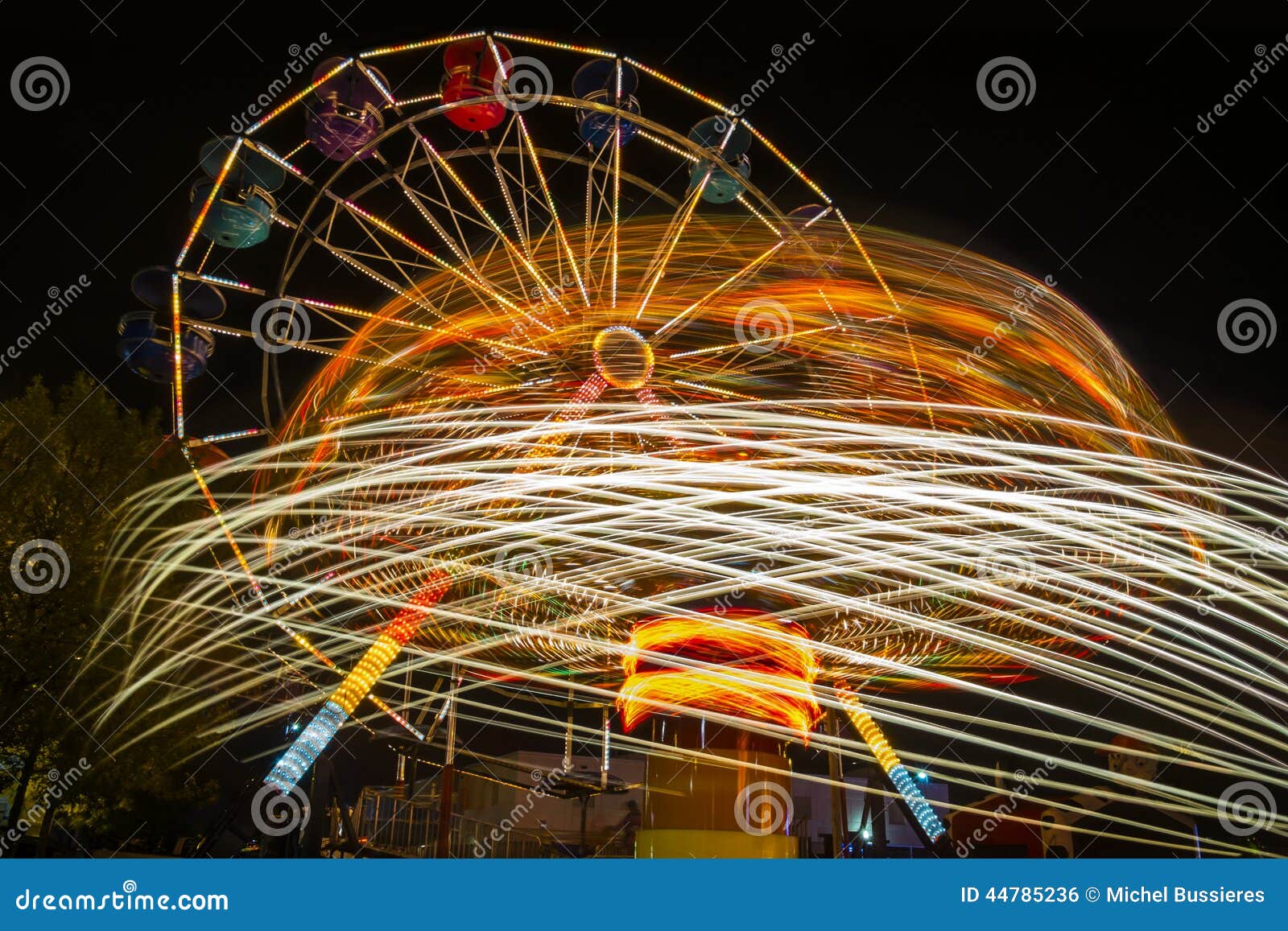 Ferris Wheel and Roundabout Stock Photo - Image of roundabout, abstract ...