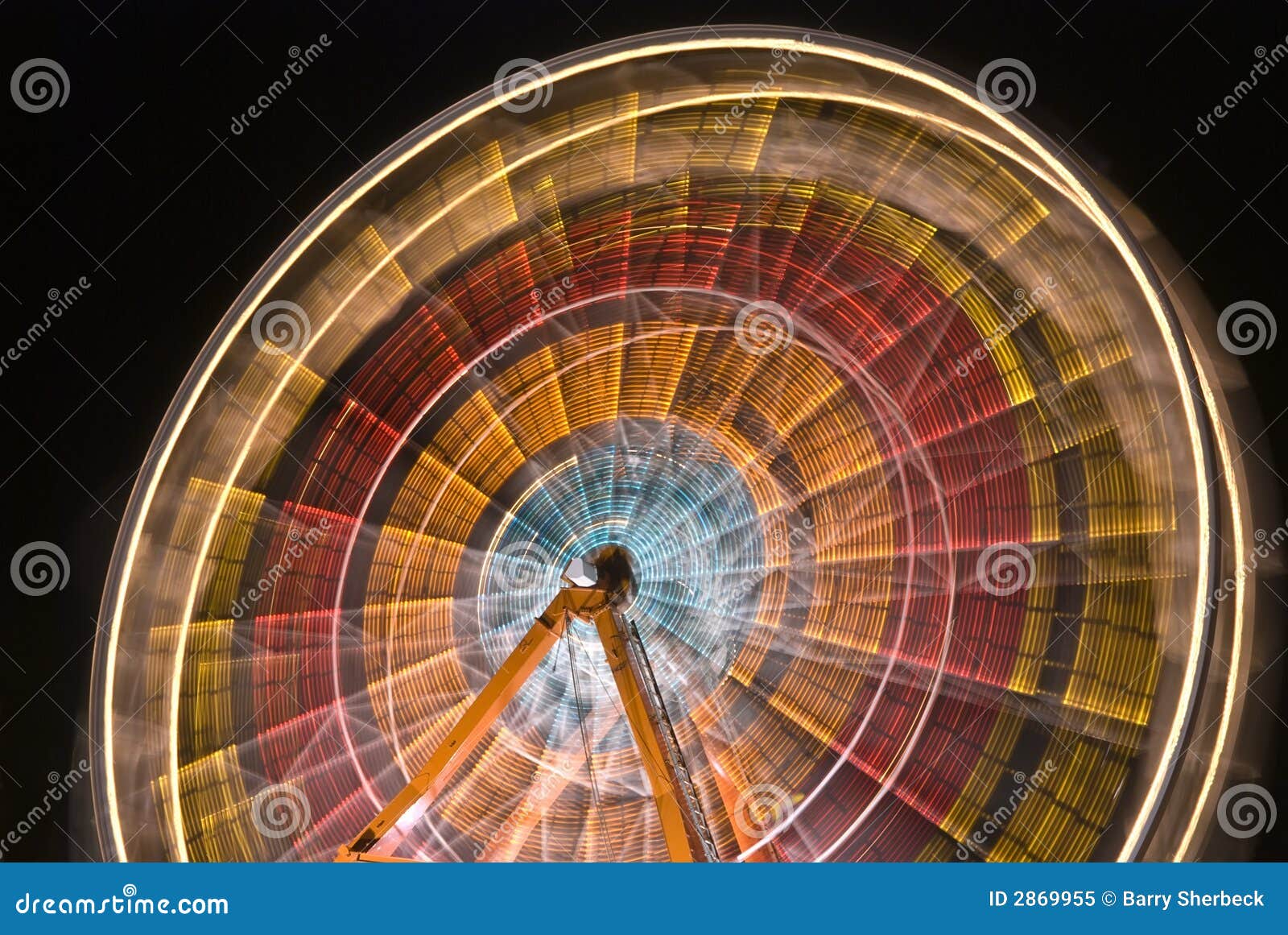 Ferris Wheel Spinning Colors Stock Image - Image of gold, kids: 2869955