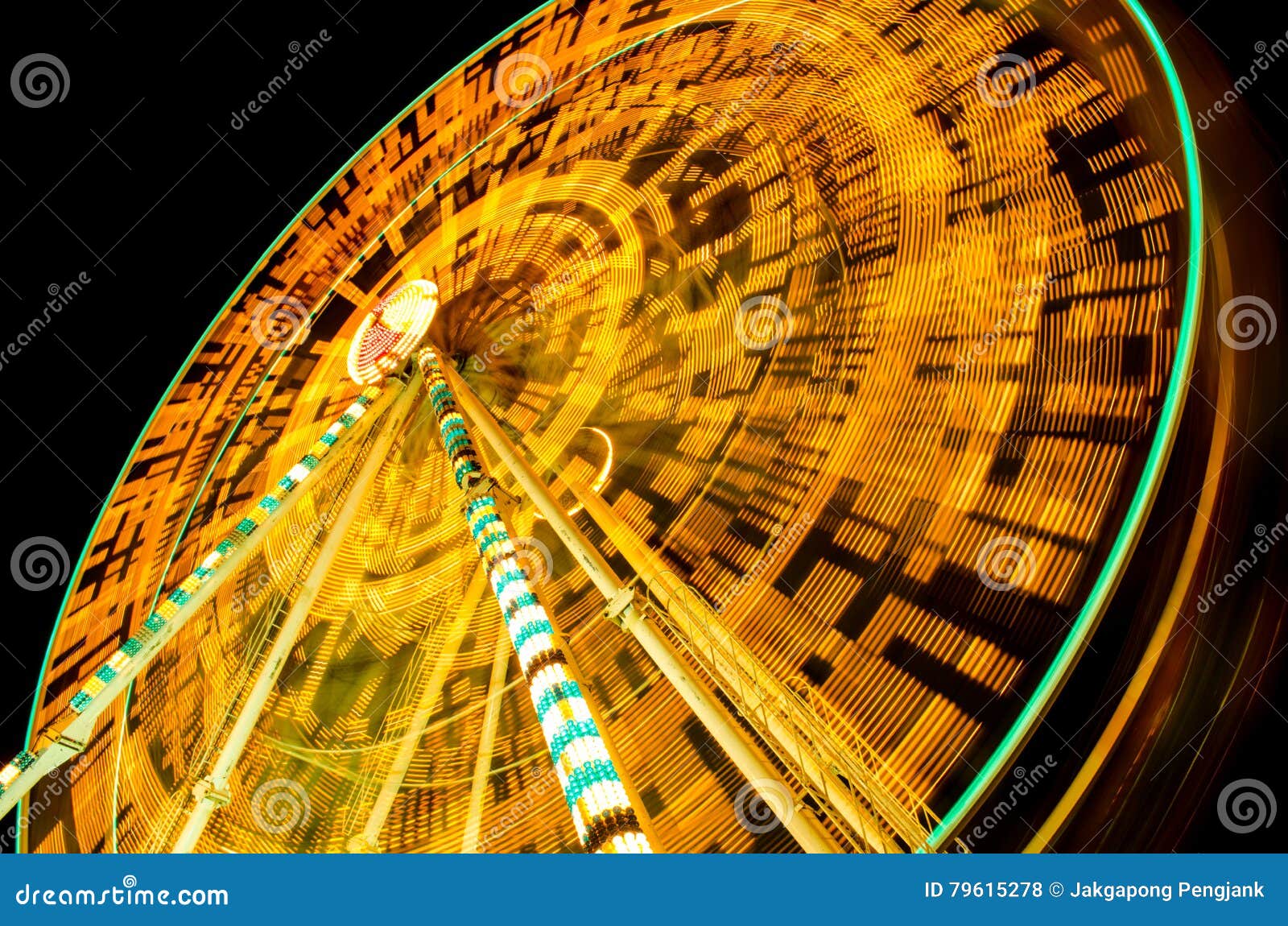 Ferris Wheel Spinning at Fairground Stock Photo - Image of evening ...