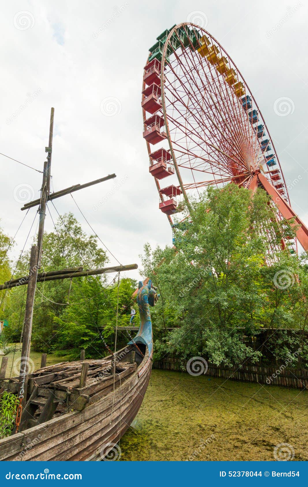 Ferris Wheel and Viking Ship Stock Photo - Image of power, amusement ...