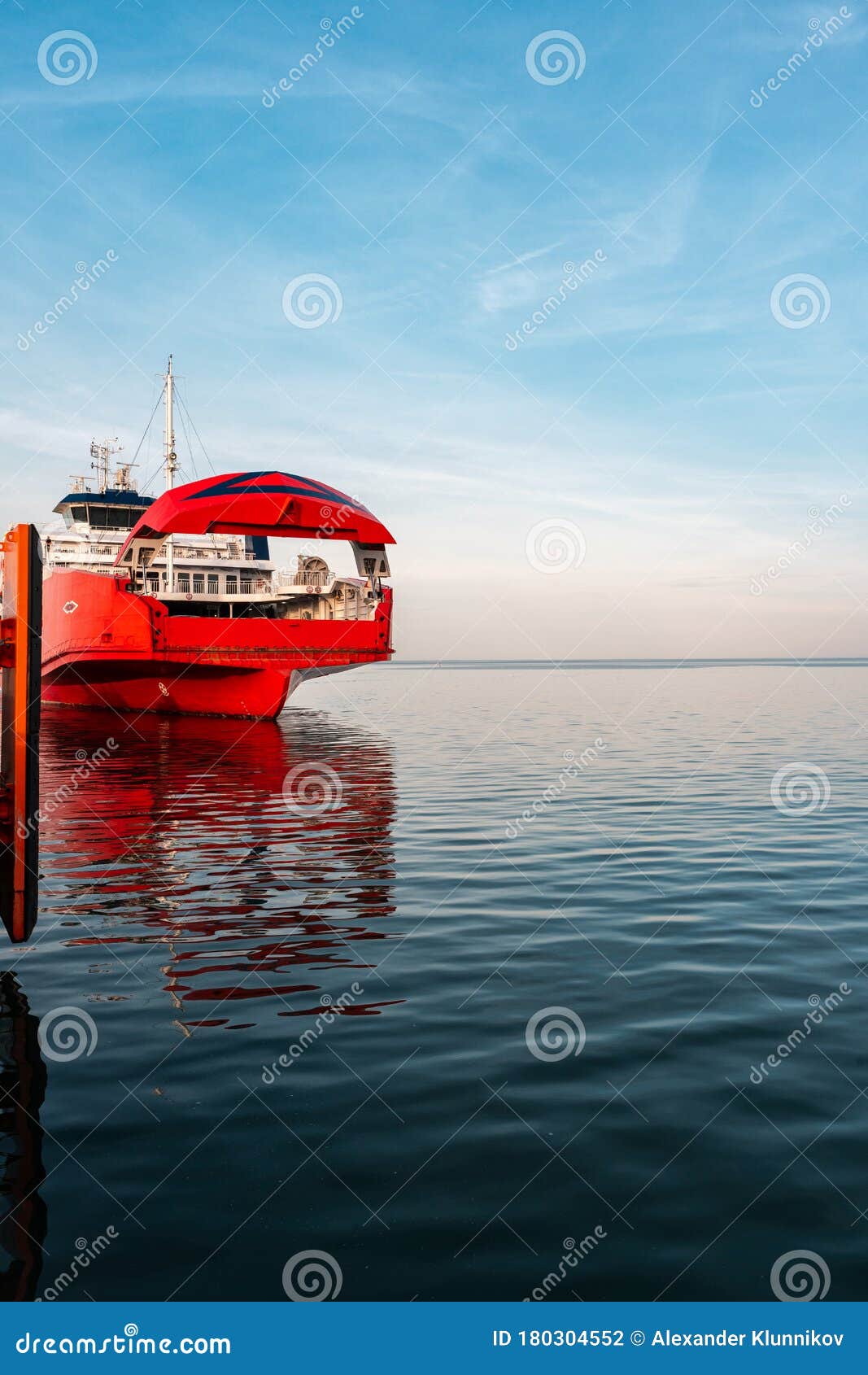 The Ferry Approaches the Mooring for Mooring. Red Ship. Clear Summer ...
