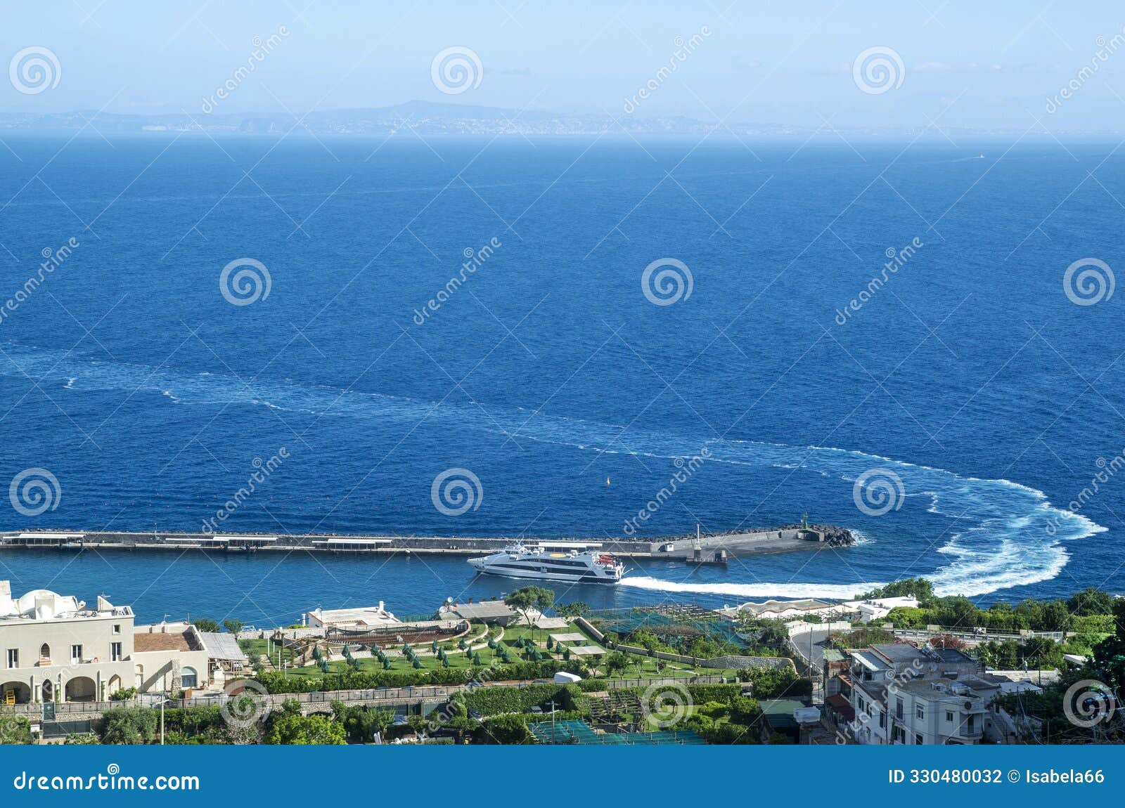 Ferry Entering the Port of the Island of Capri. View from Above Stock ...