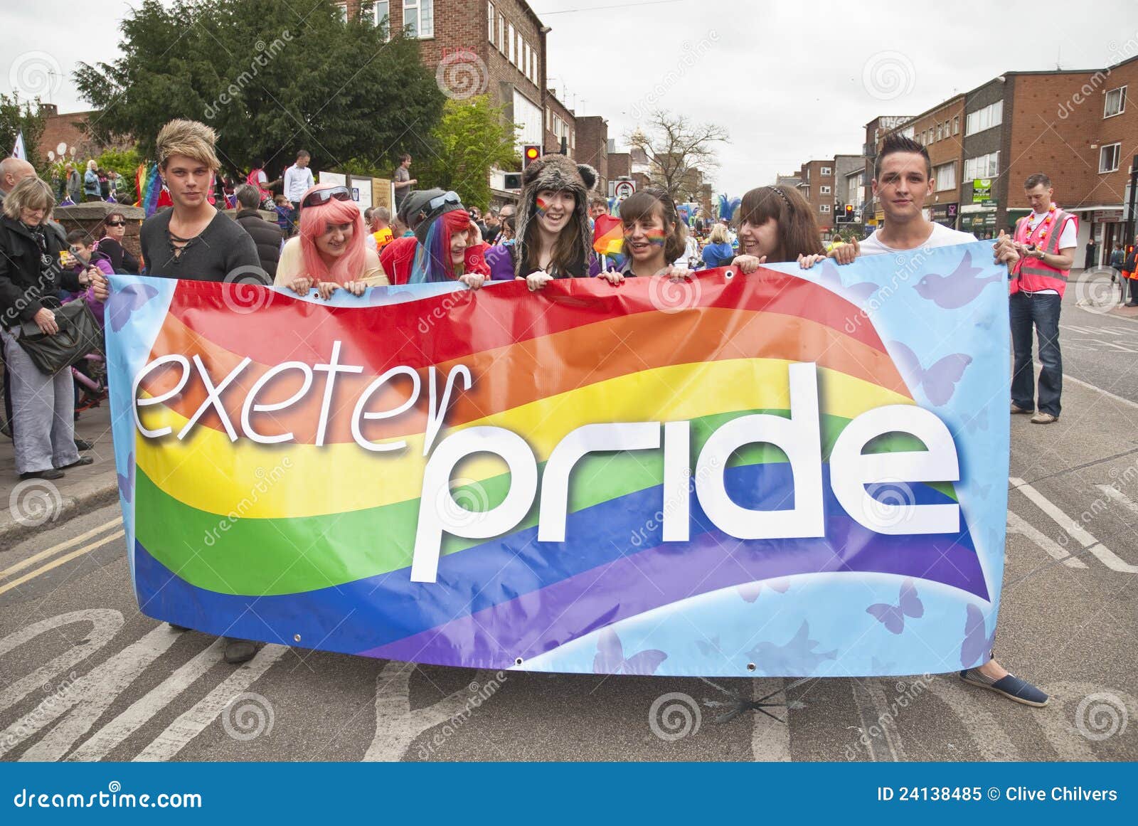 Festival Goers Hold Up the Exeter Pride Banner Editorial Image - Image of politics, bisexual ...