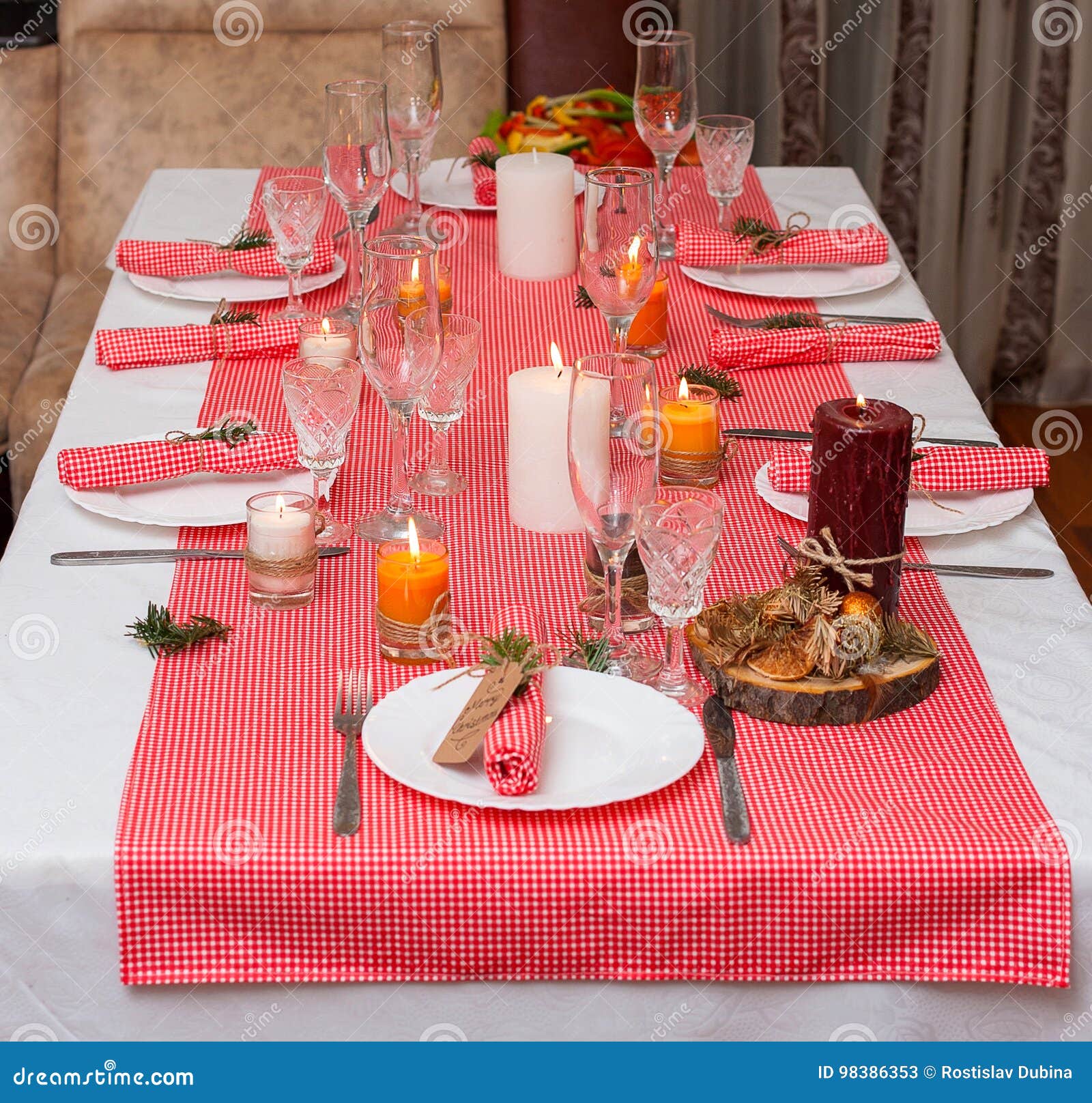 Festive Composition with Candles and Plates. Table Decoration. a ... Festive Composition with Candles and Plates. Table Decoration. a ...